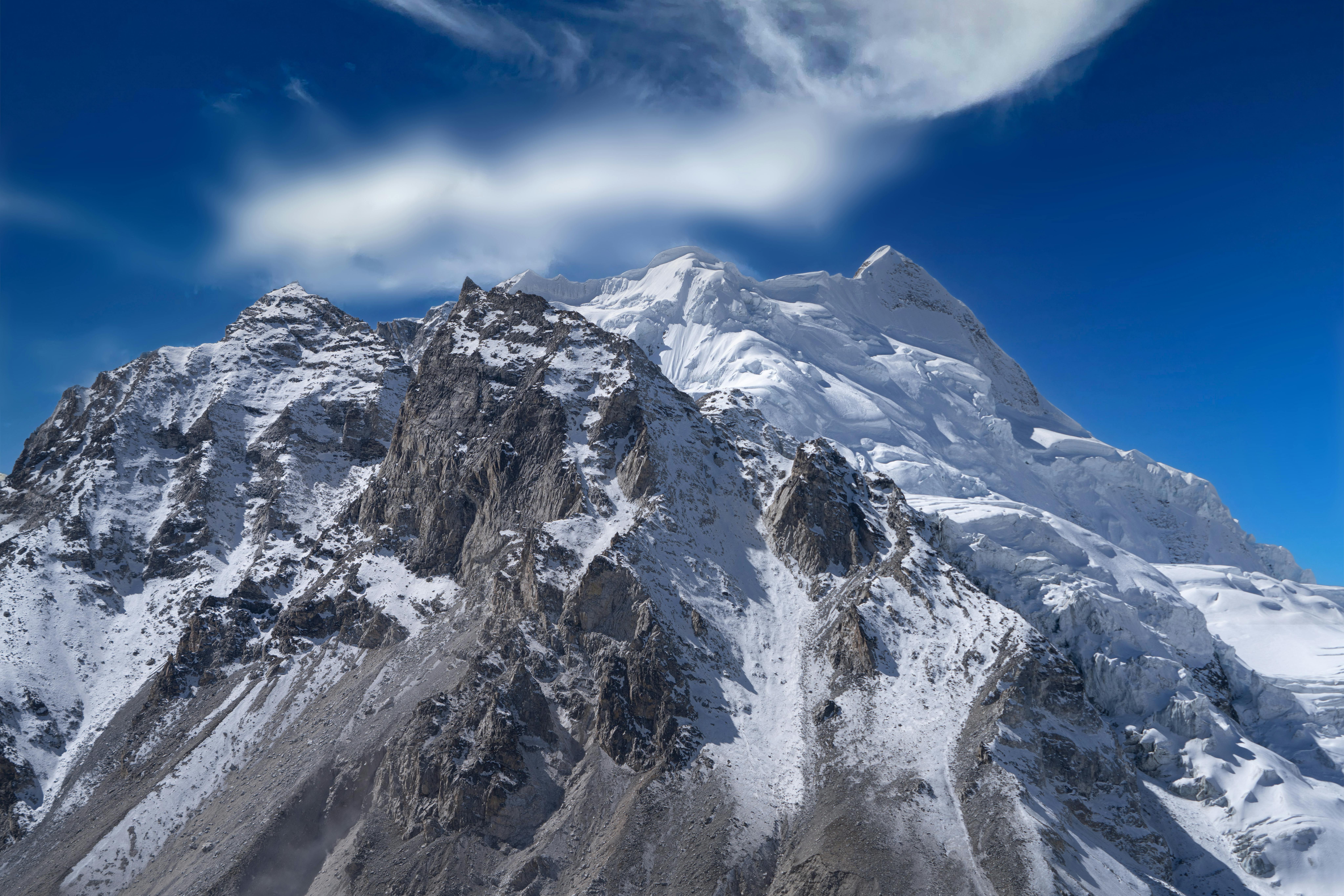 Majestic Snow-Covered Mountain Peak · Free Stock Photo