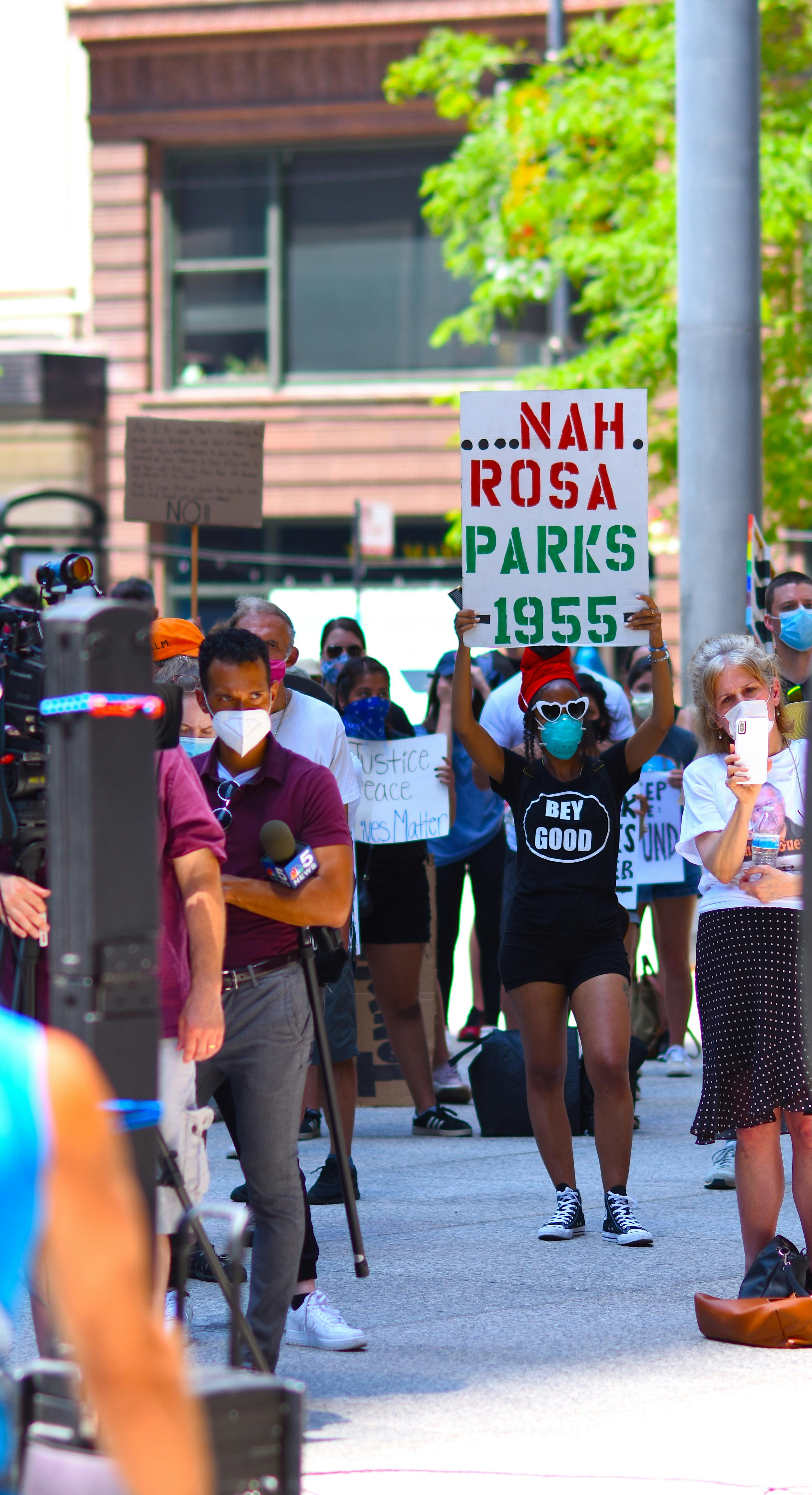 Urban Protest with Rosa Parks Sign and Activists · Free Stock Photo