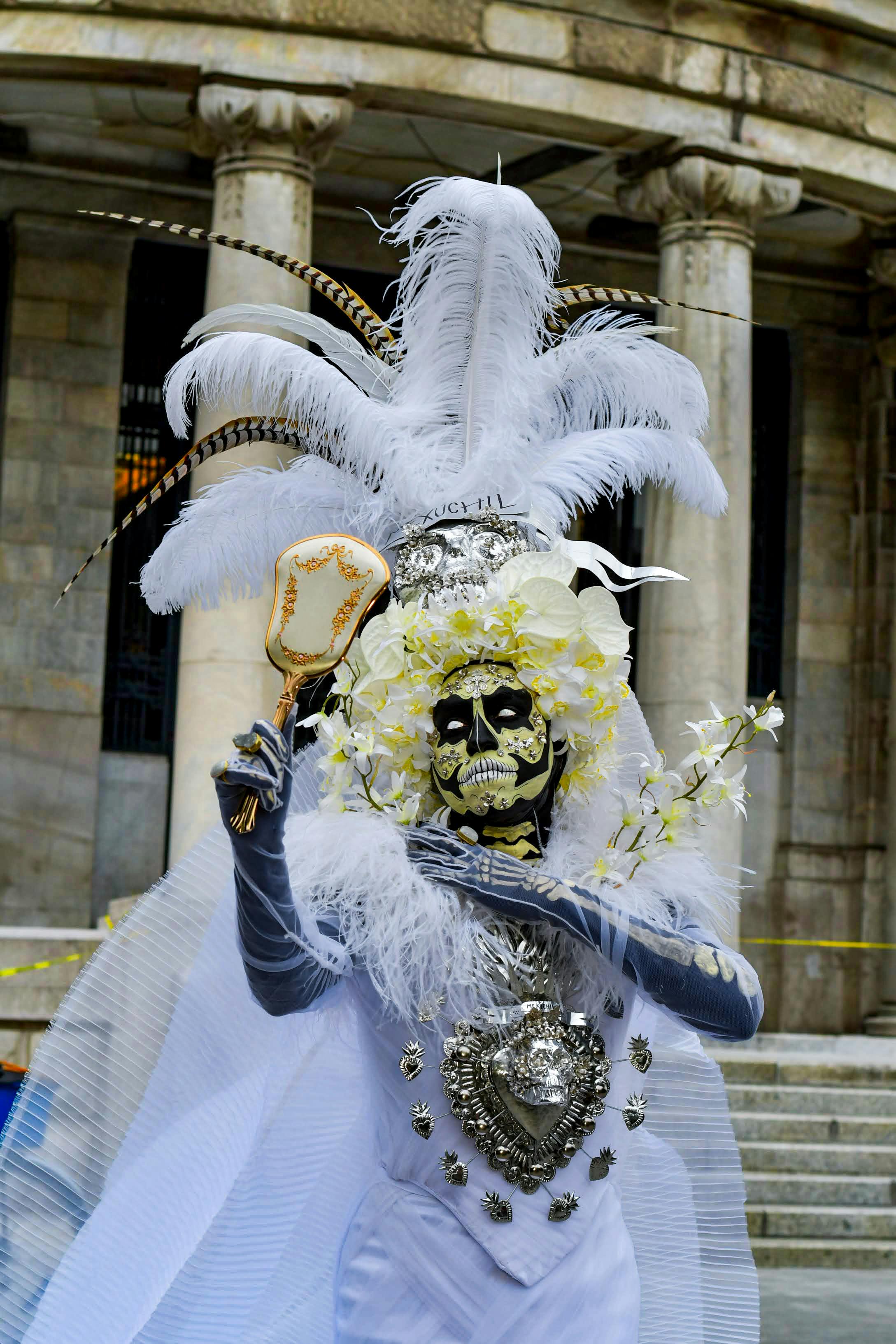 Skeleton Themed Costume with Feathered Headpiece · Free Stock Photo