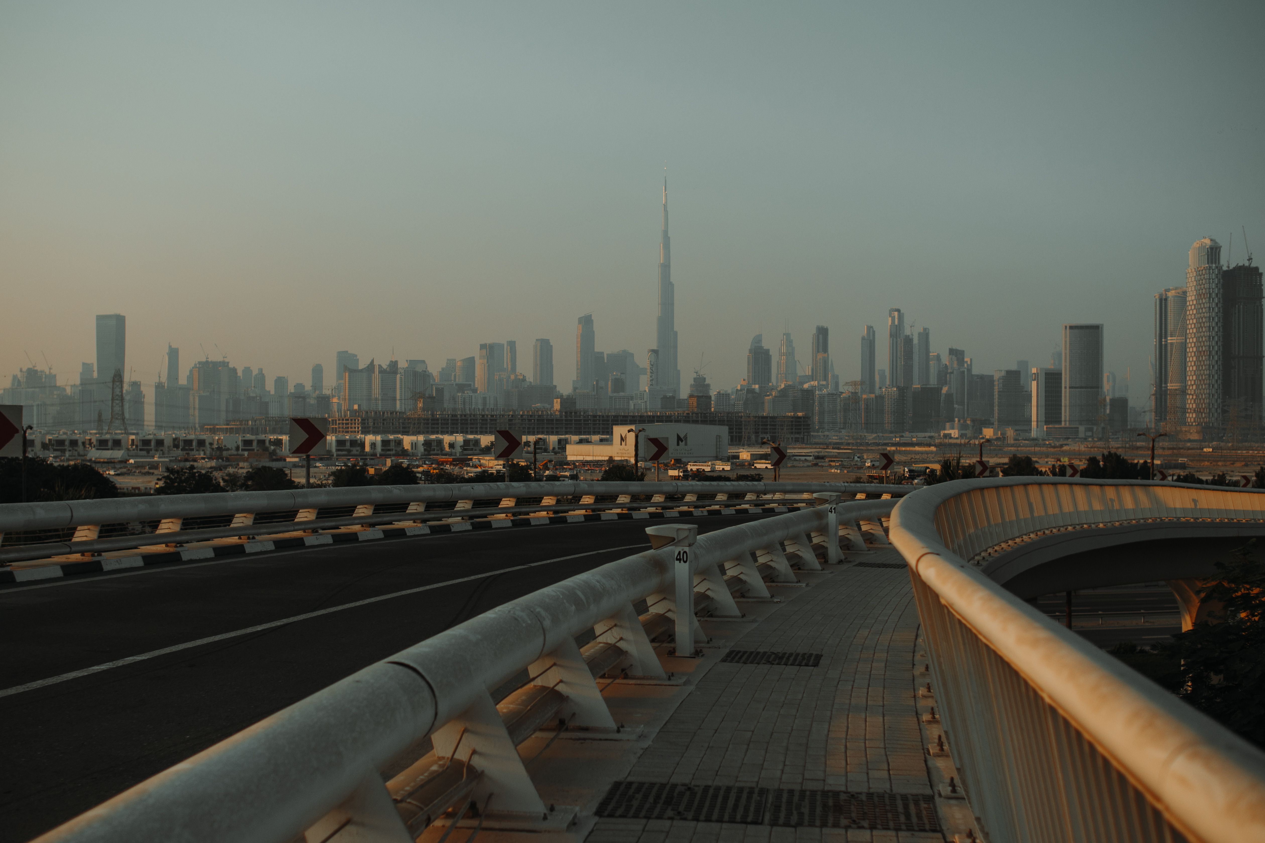 Dubai skyline with Burj Khalifa in sunset light · Free Stock Photo