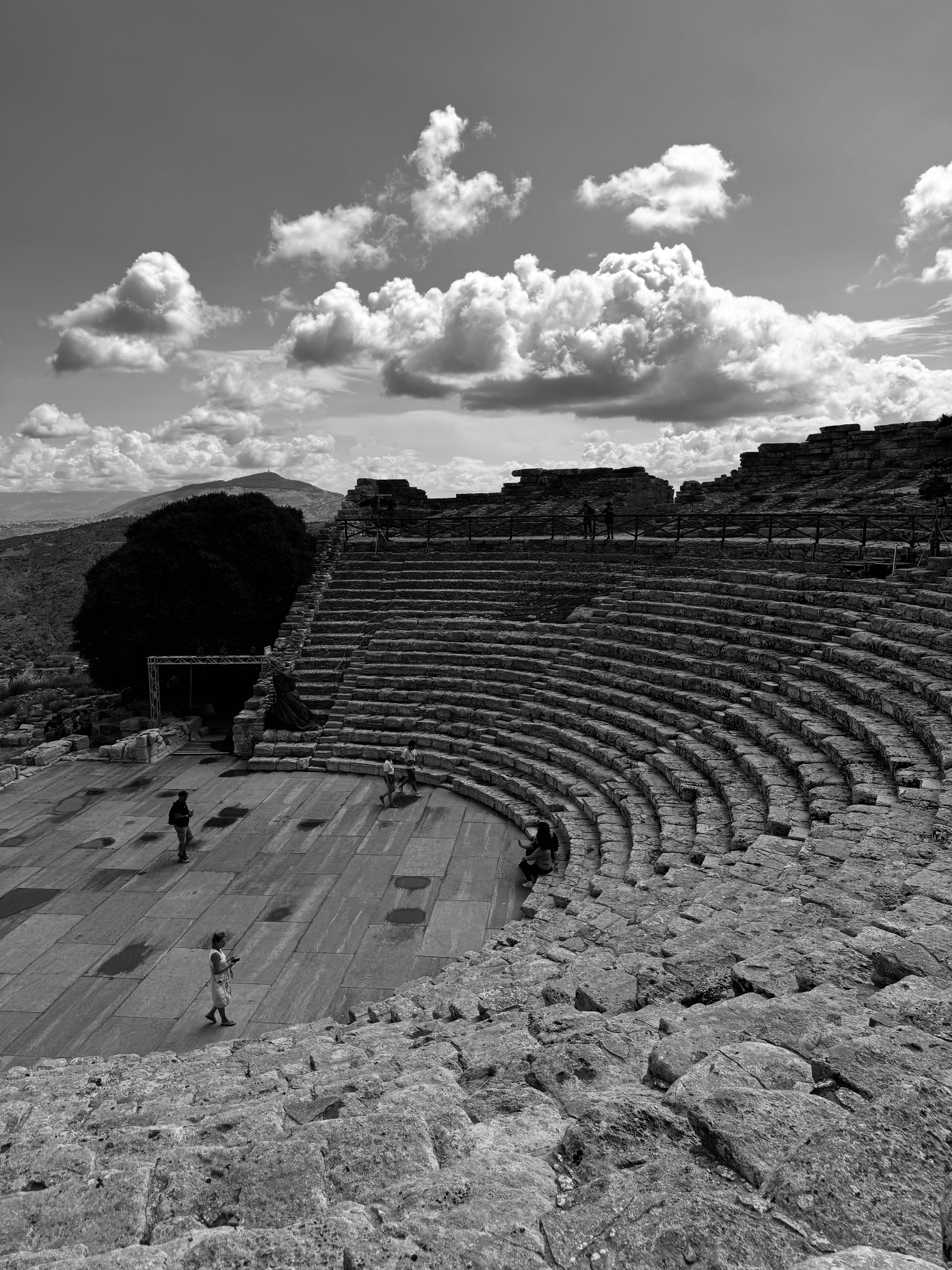Ancient Stone Amphitheater Under Dramatic Sky · Free Stock Photo