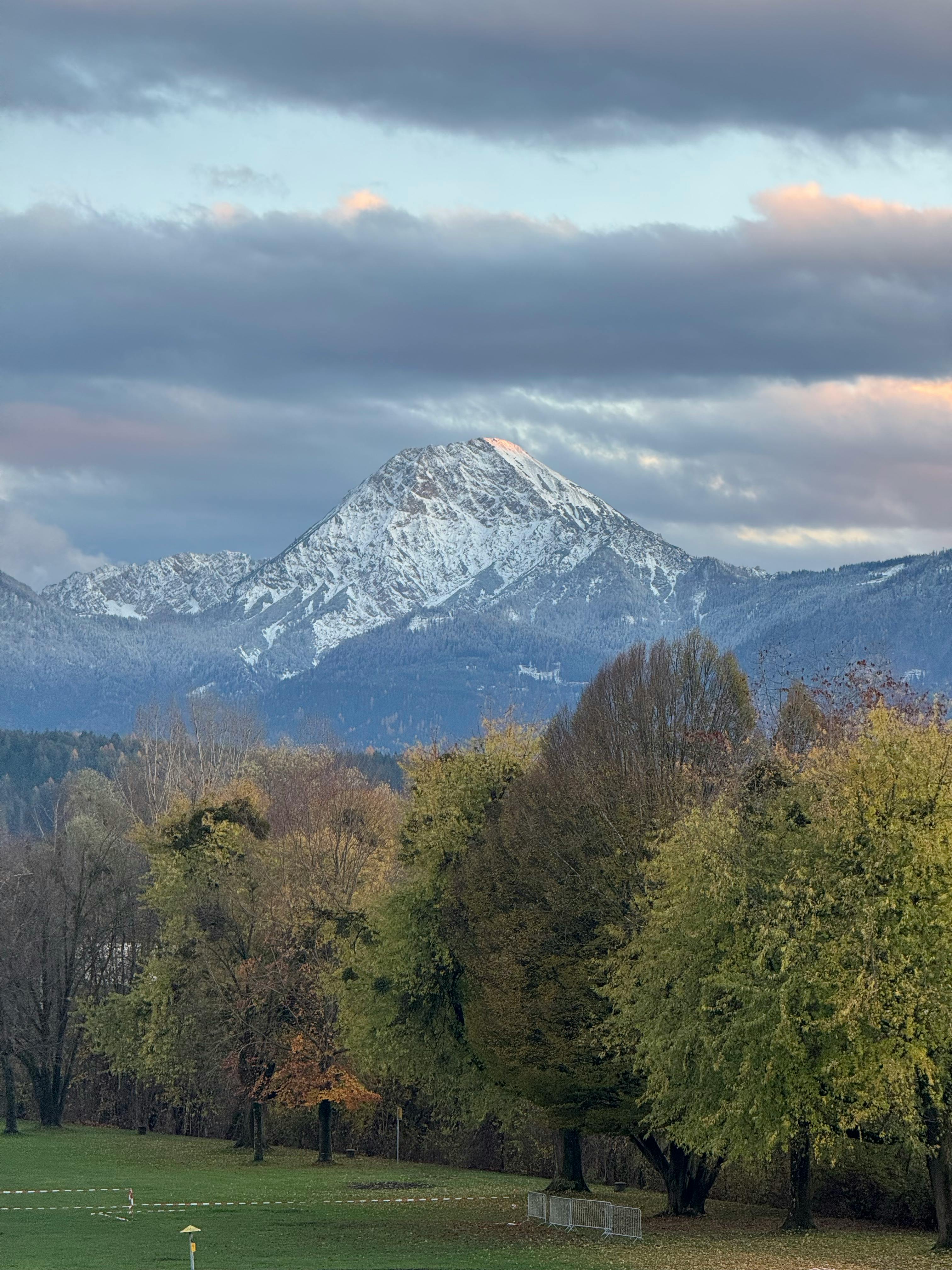 Snow-Capped Mountain Overlooking Villach, Austria · Free Stock Photo