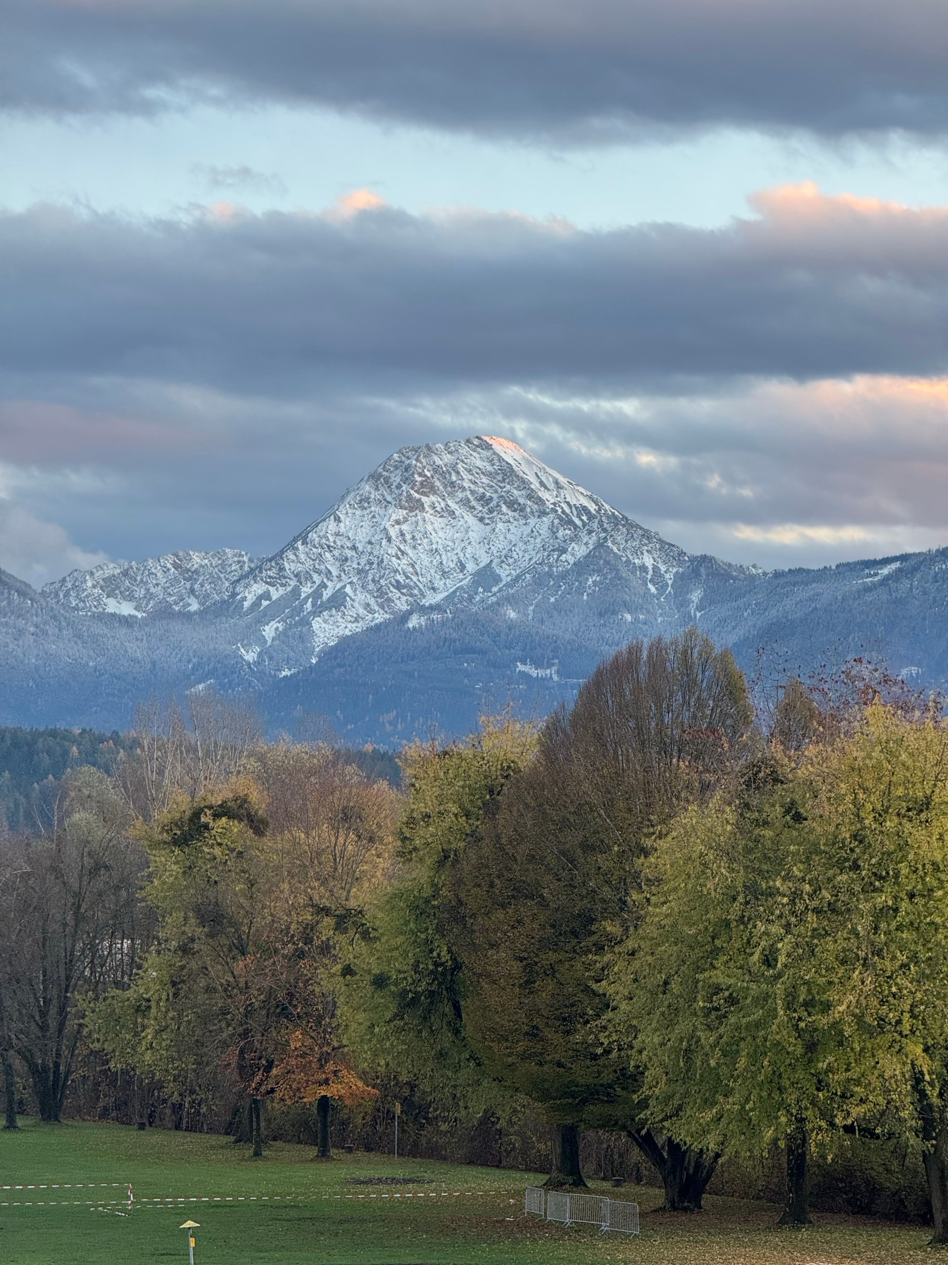 Snow-Capped Mountain Overlooking Villach, Austria · Free Stock Photo