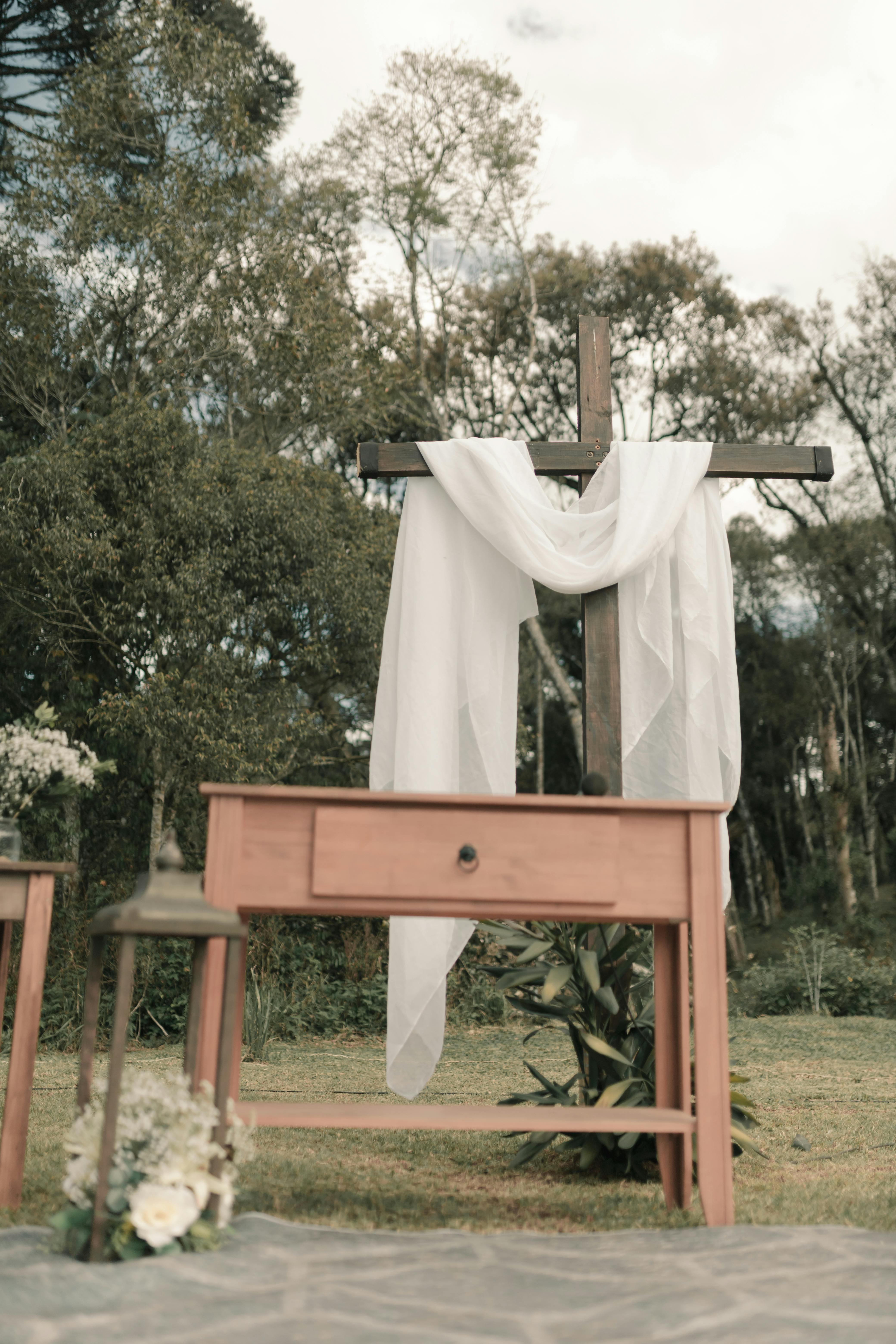 Outdoor Wedding Ceremony Wooden Cross Setup · Free Stock Photo