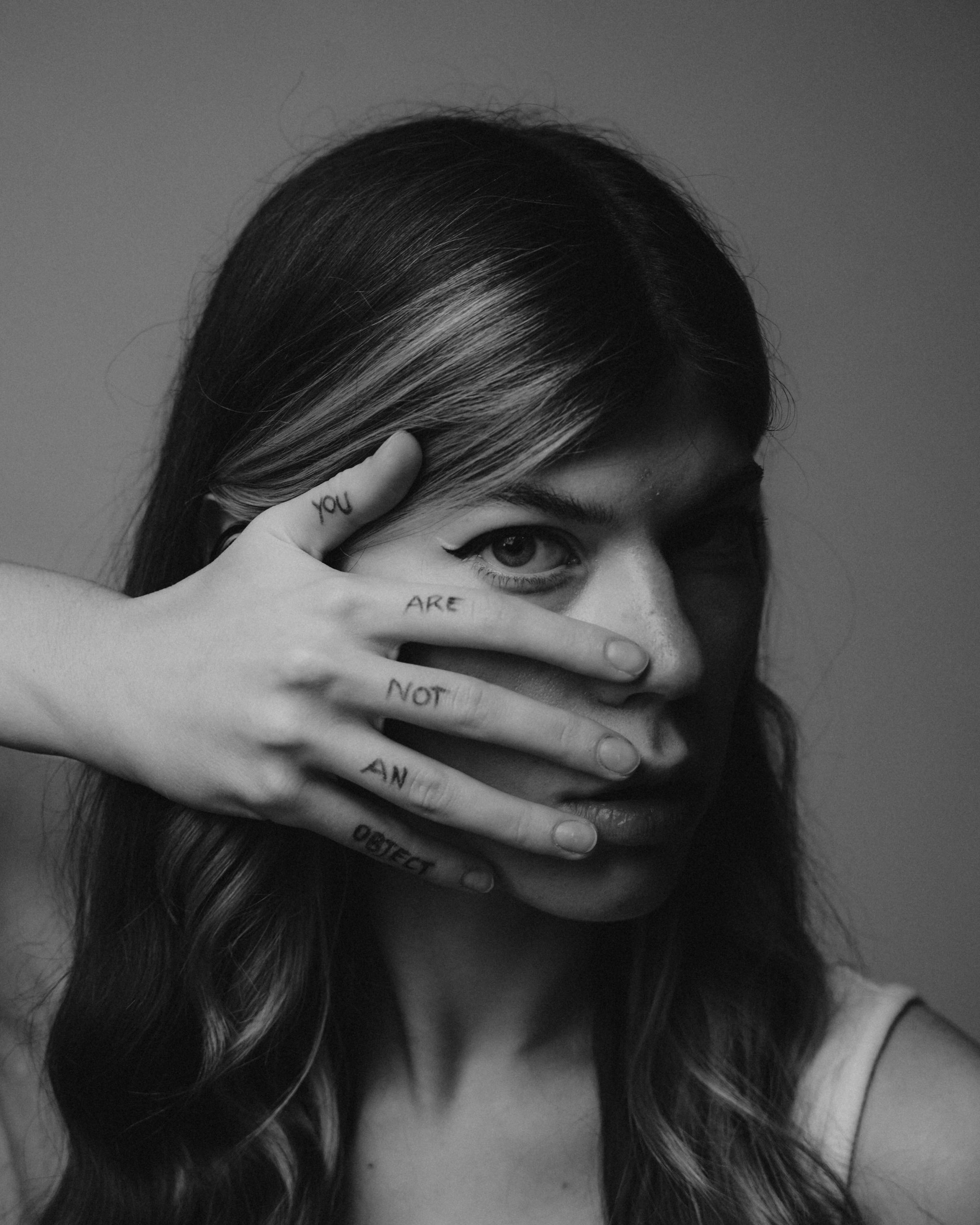 Artistic Portrait with Message on Fingers · Free Stock Photo