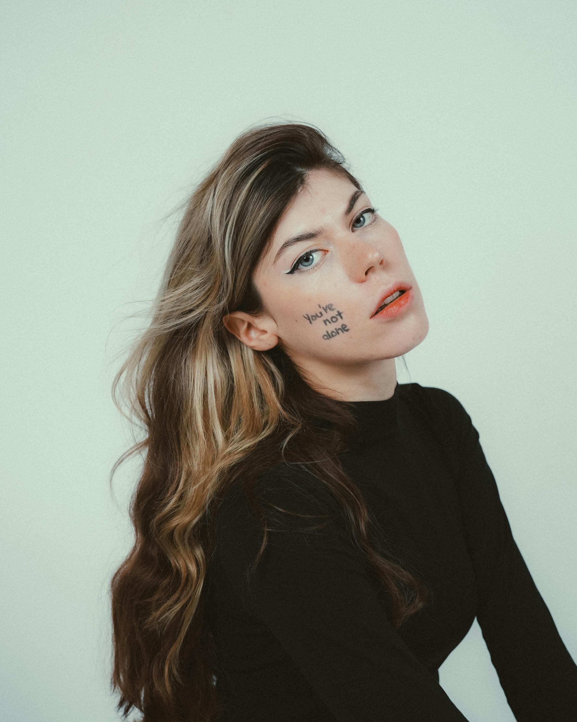 Empowering Portrait with Encouraging Message · Free Stock Photo