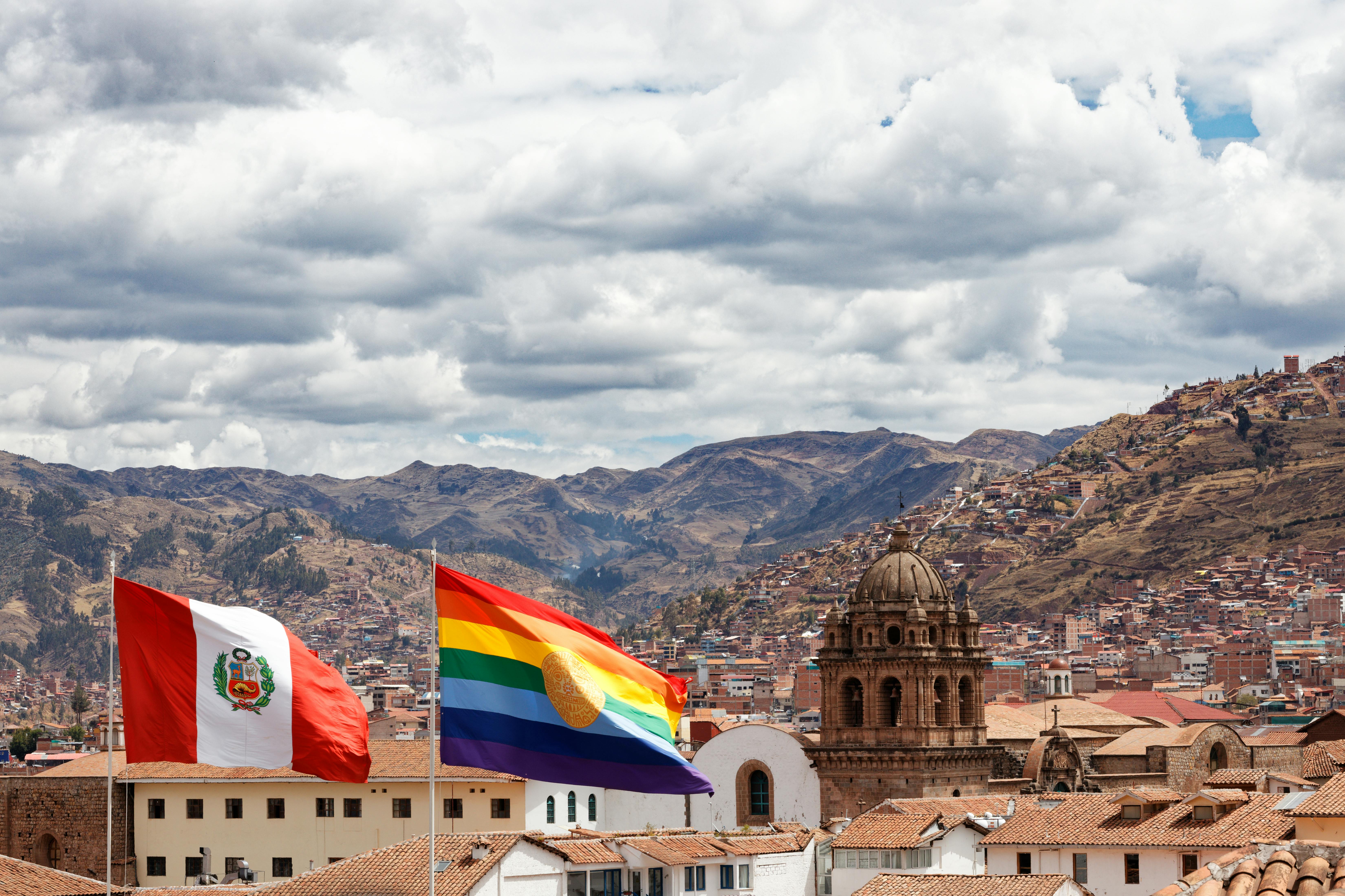 Cusco Cityscape with Peruvian and Tahuantinsuyo Flags · Free Stock Photo