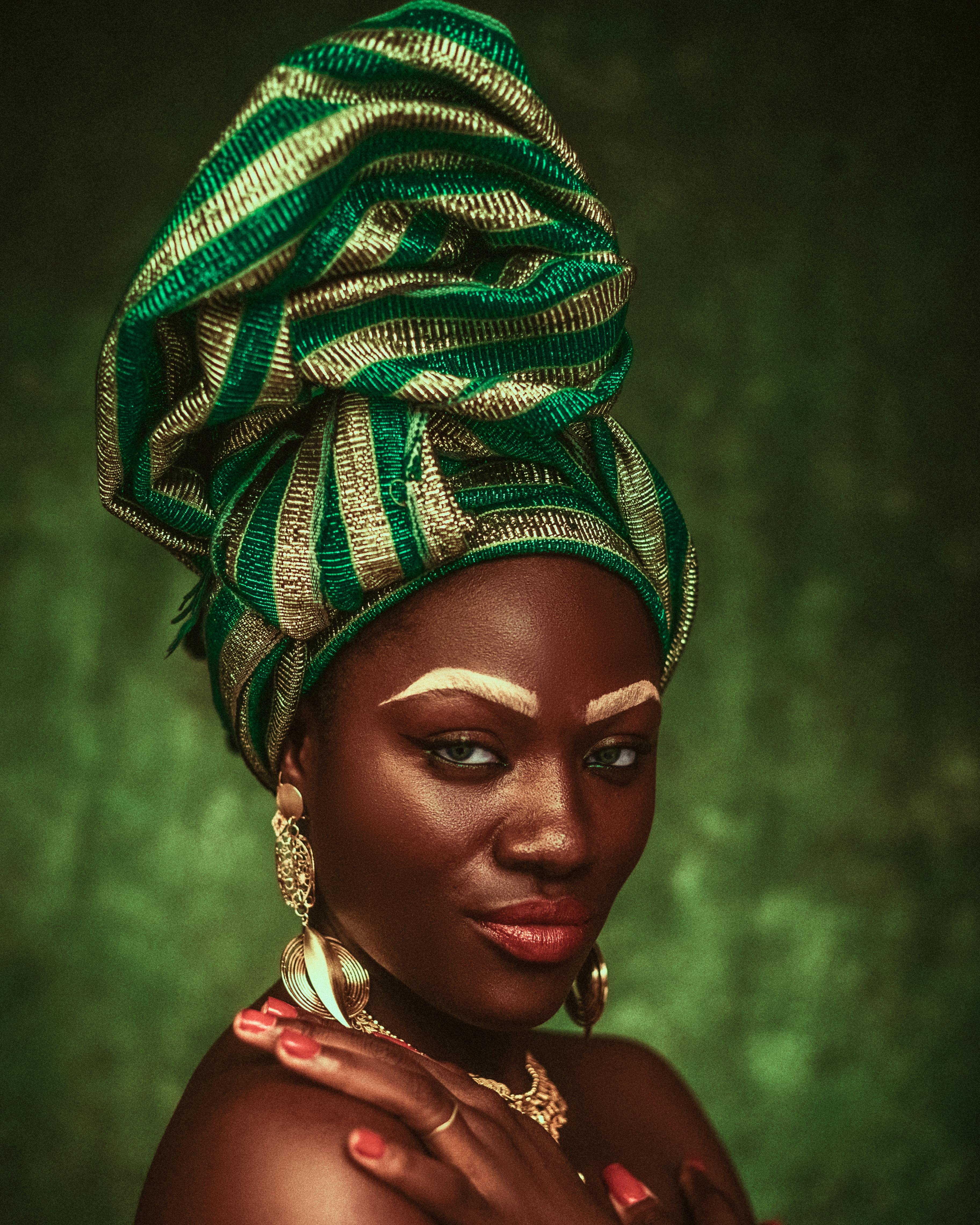 Elegant African Woman in Traditional Headdress · Free Stock Photo