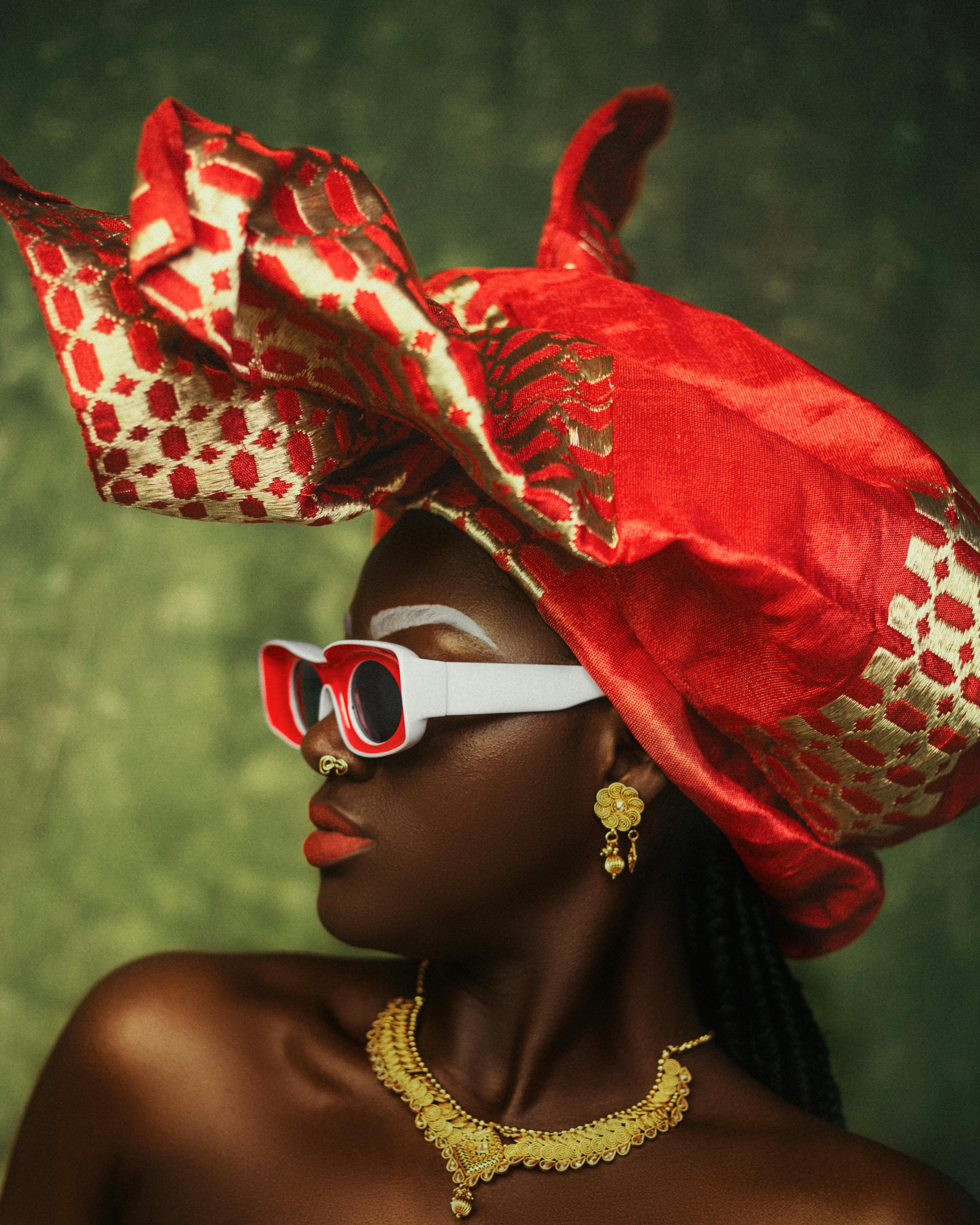 Stylish African Woman in Gele and Sunglasses · Free Stock Photo