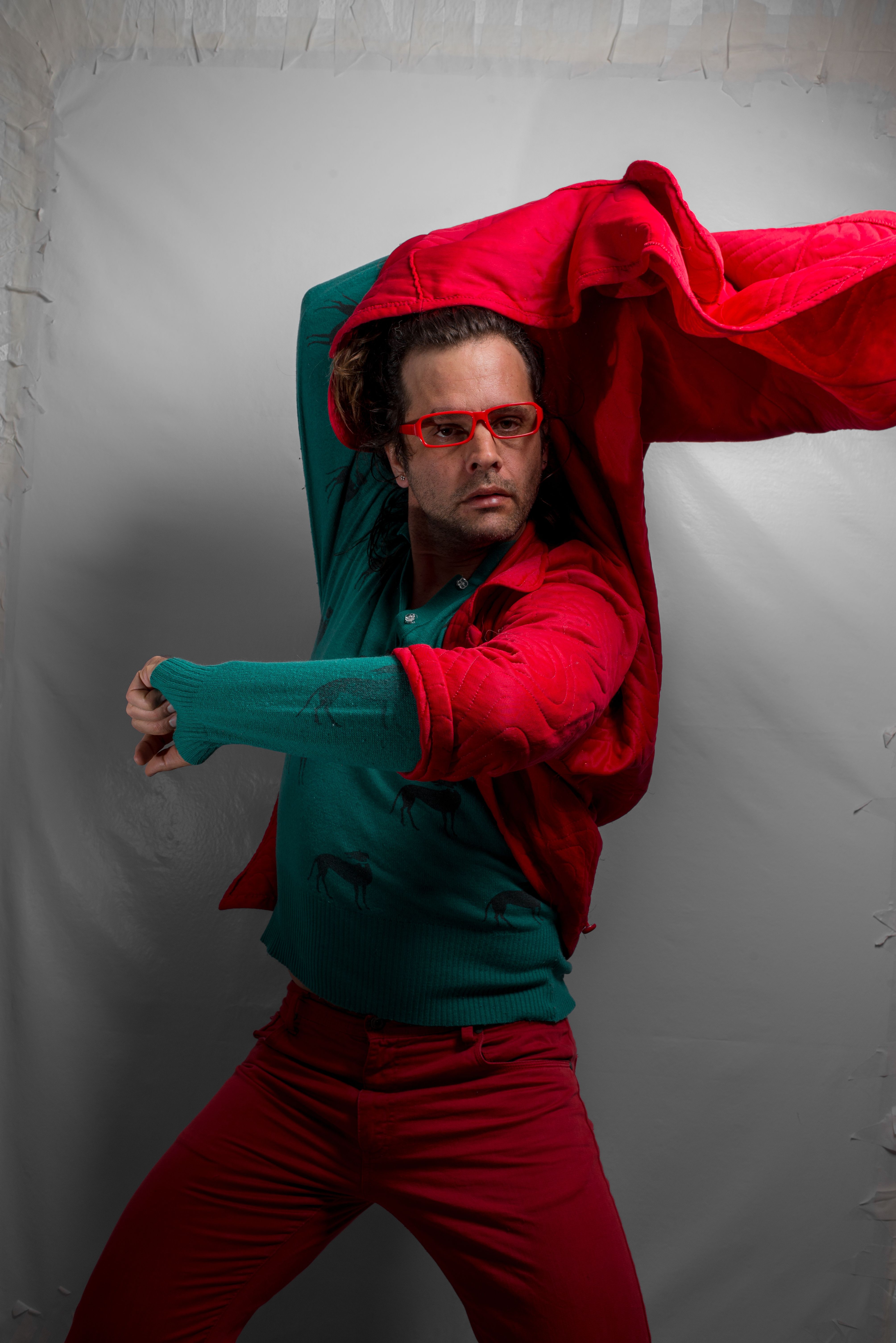 Dynamic Portrait of a Fashionable Man in Vibrant Colors · Free Stock Photo