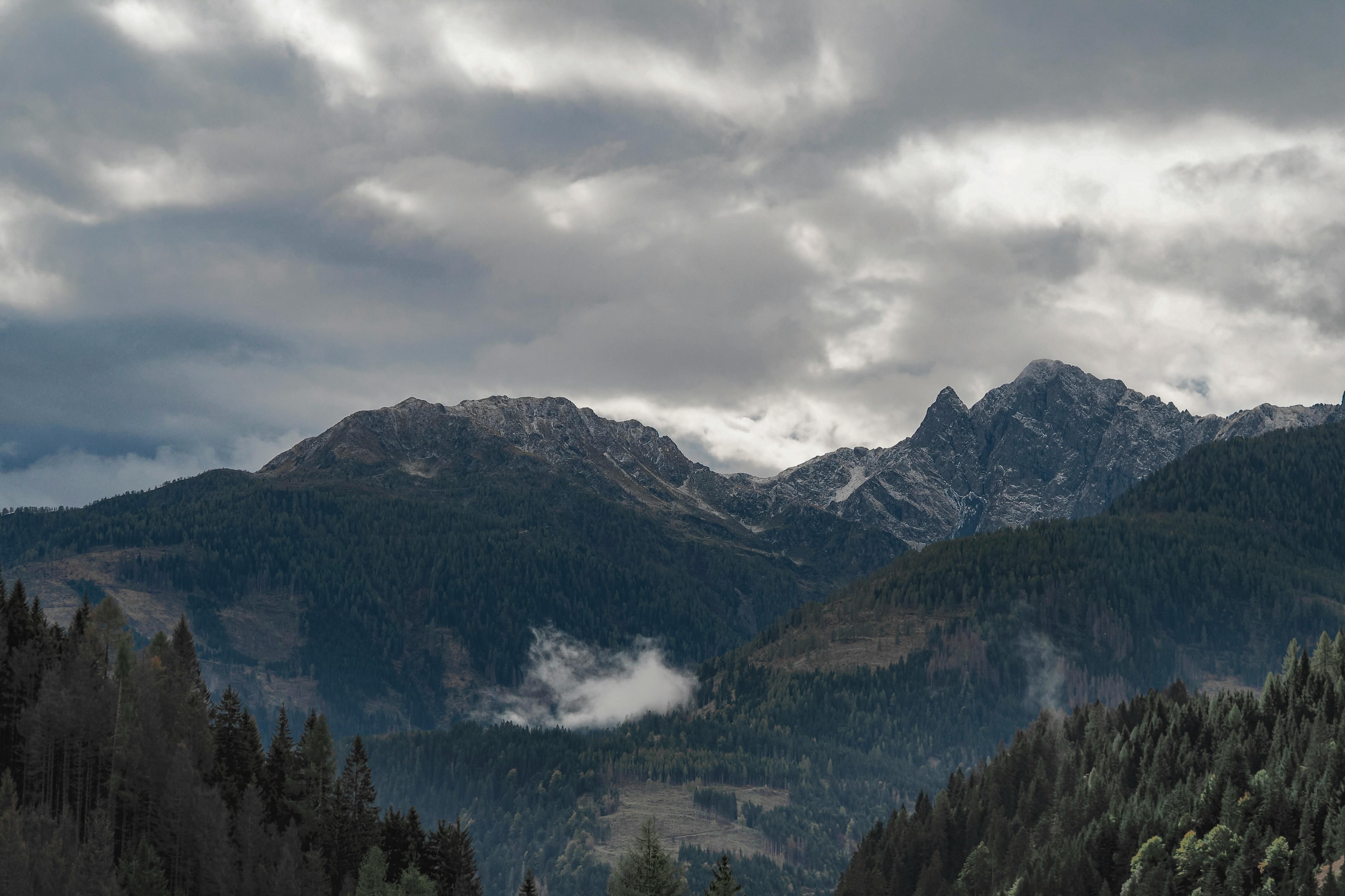 Dramatic Mountain Range with Forest Views · Free Stock Photo