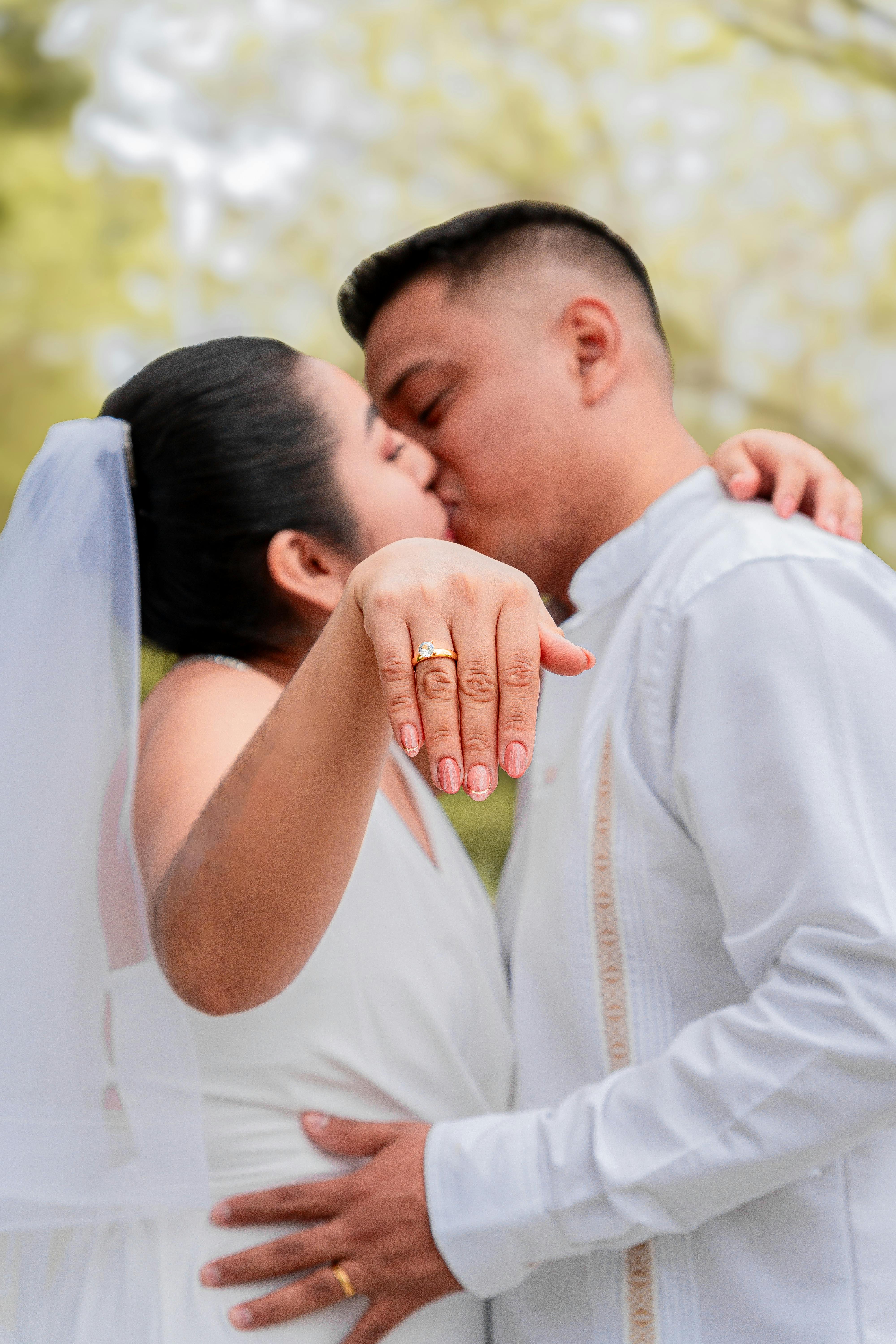 Groom Kissing Bride Neck · Free Stock Photo