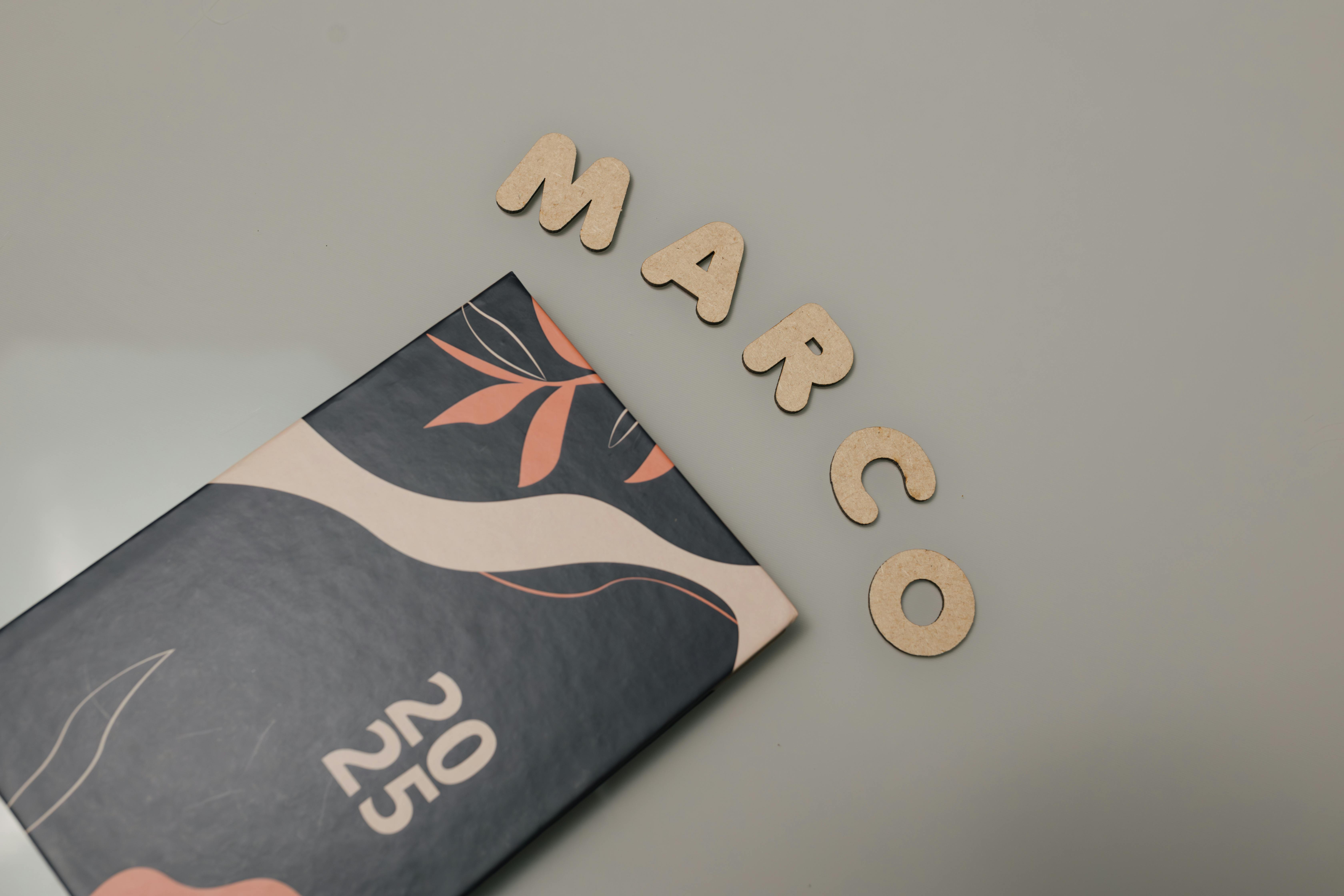 Flat lay of 2025 planner and wooden letters · Free Stock Photo