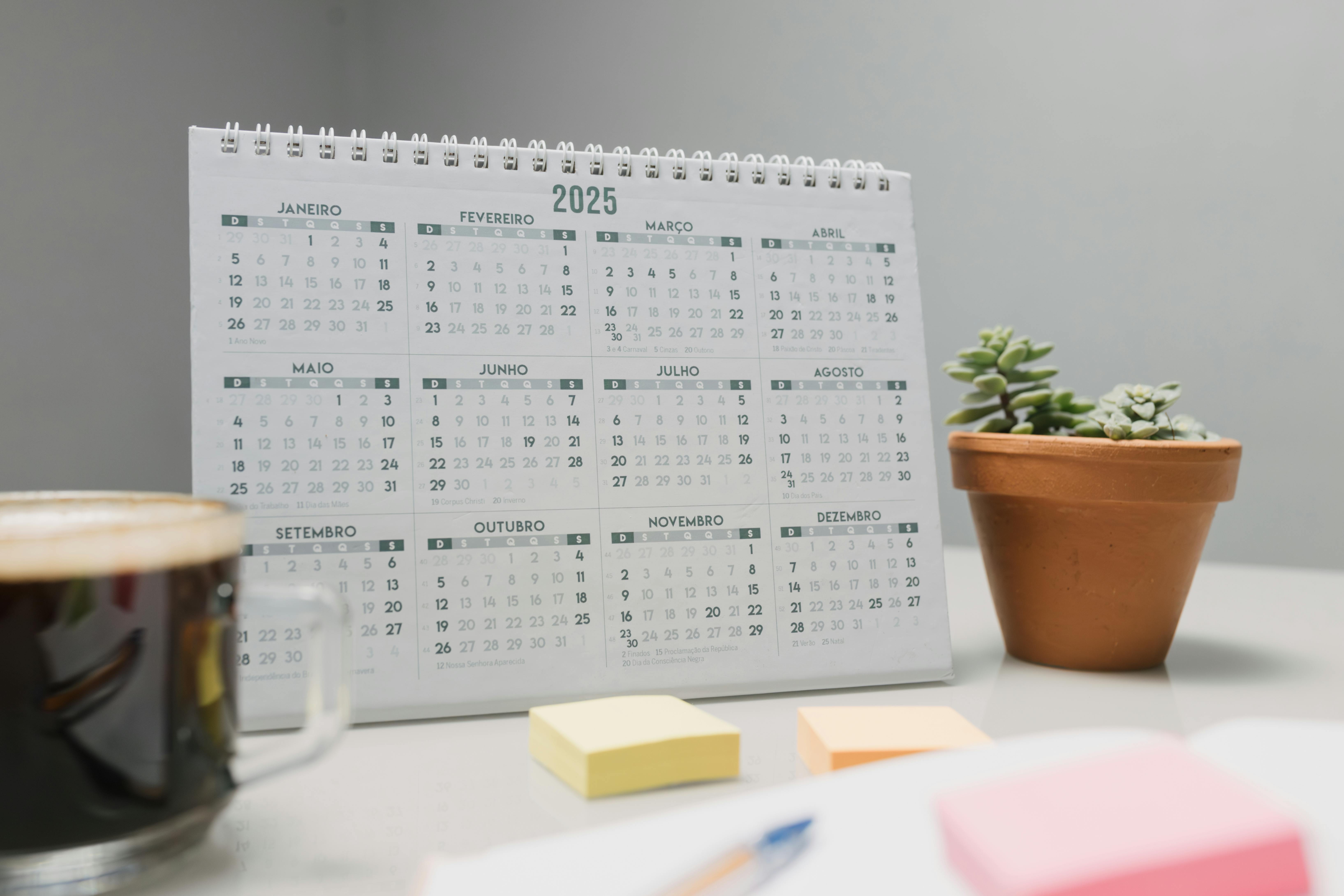 2025 Desk Calendar with Coffee and Succulents · Free Stock Photo