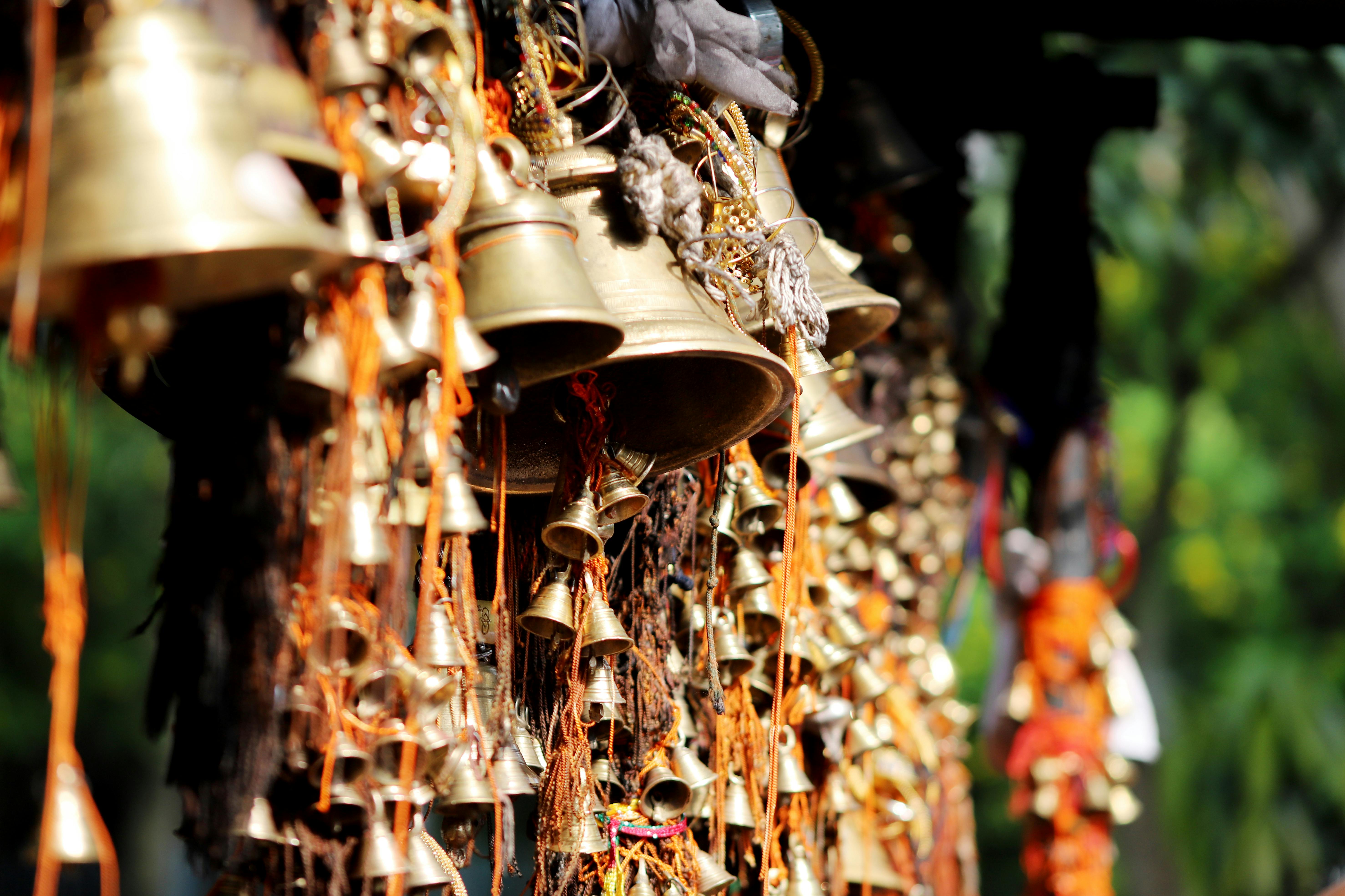 Photography of Black Hanging Bells during Daytime · Free Stock Photo
