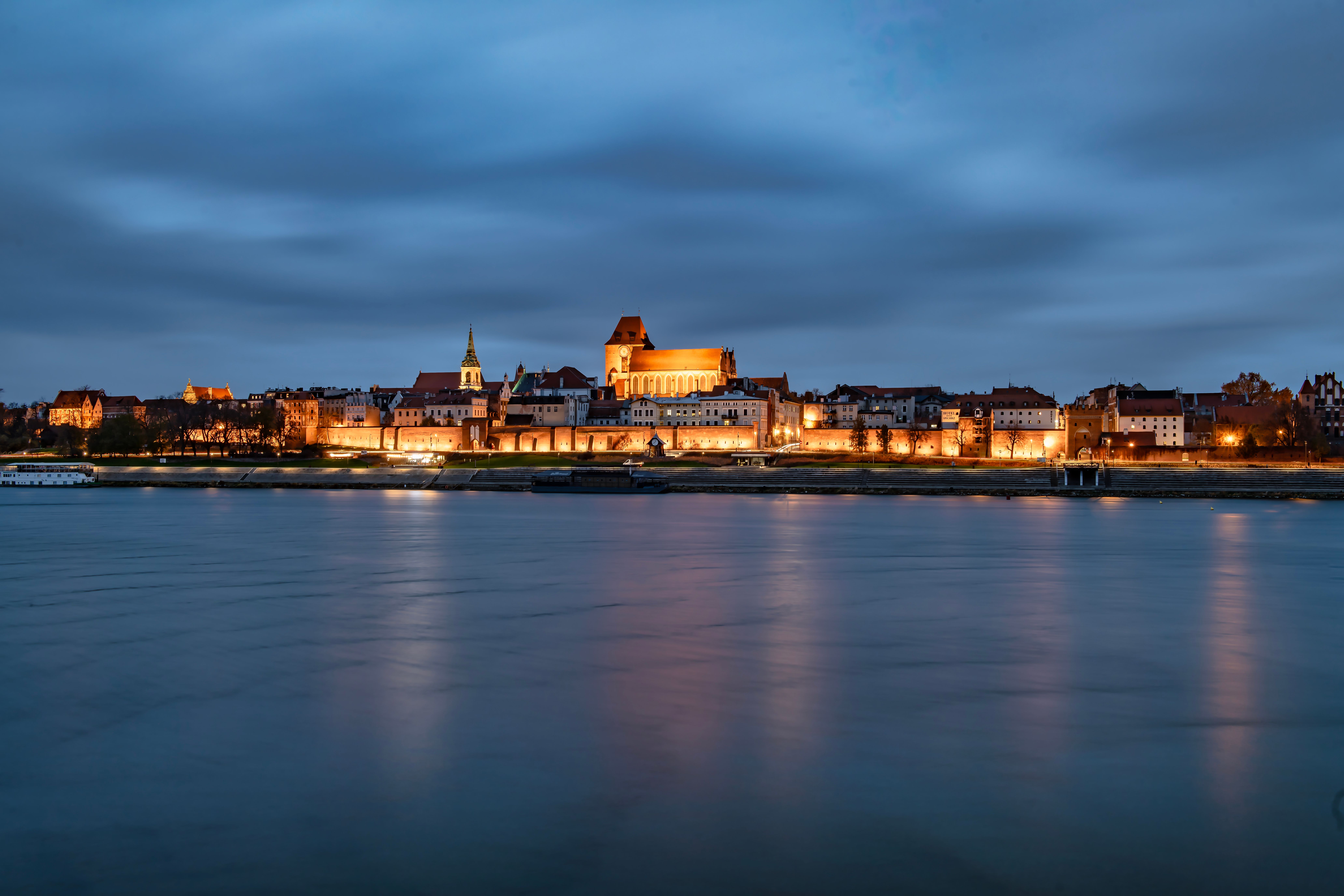 Night Skyline of Torun at the Vistula River · Free Stock Photo