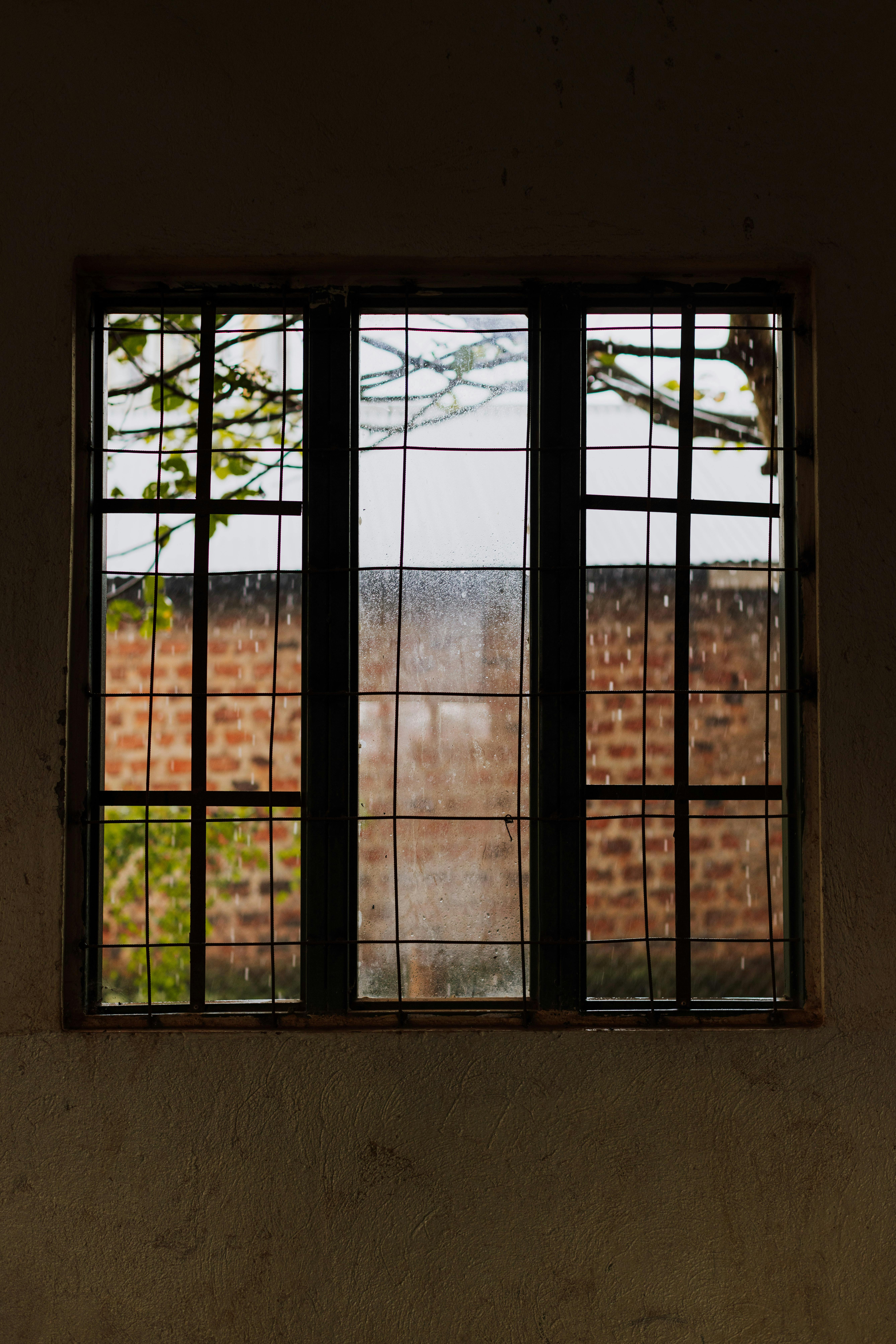Rustic View Through a Window in Uganda · Free Stock Photo