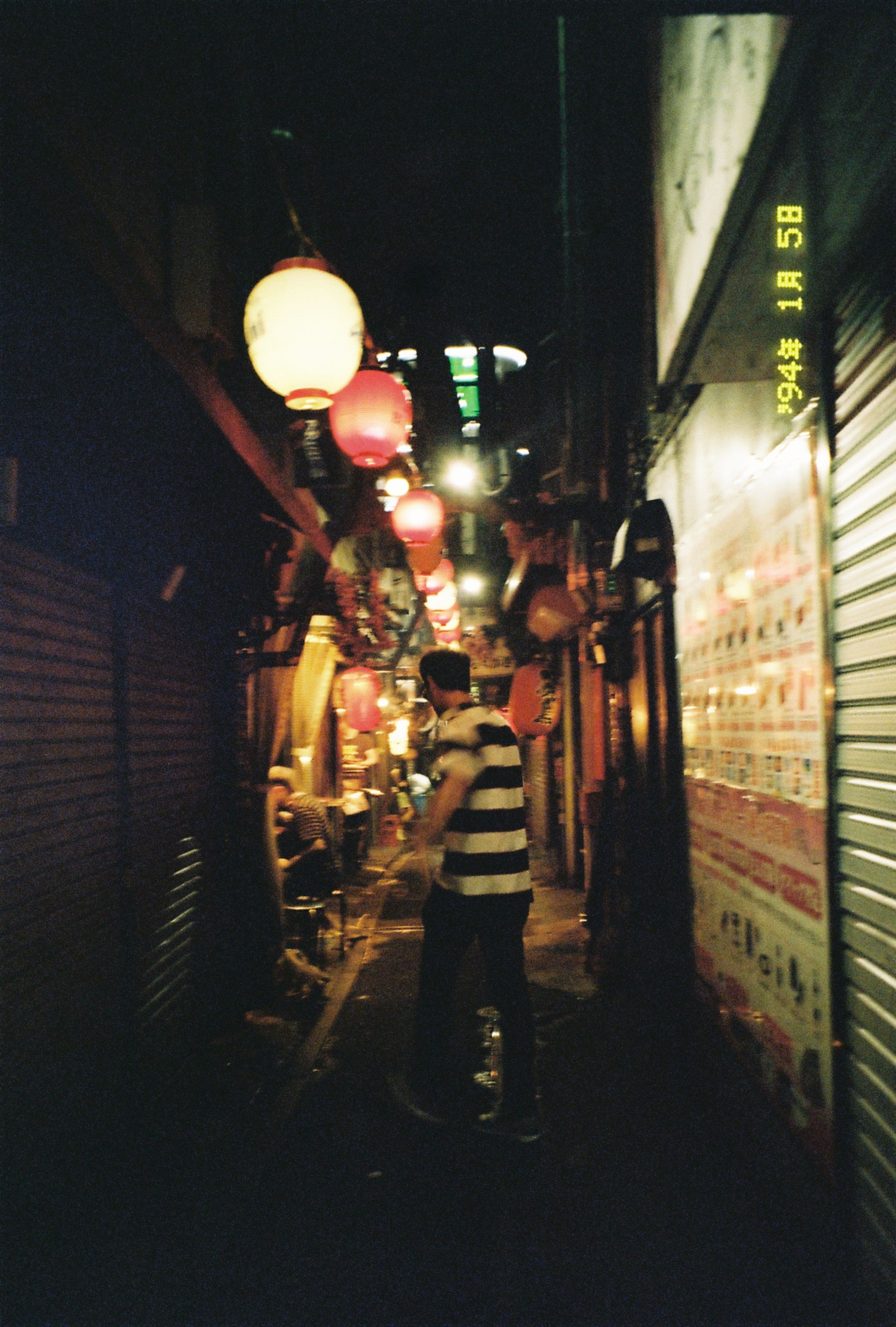 Moody Alley Scene with Lanterns at Night · Free Stock Photo