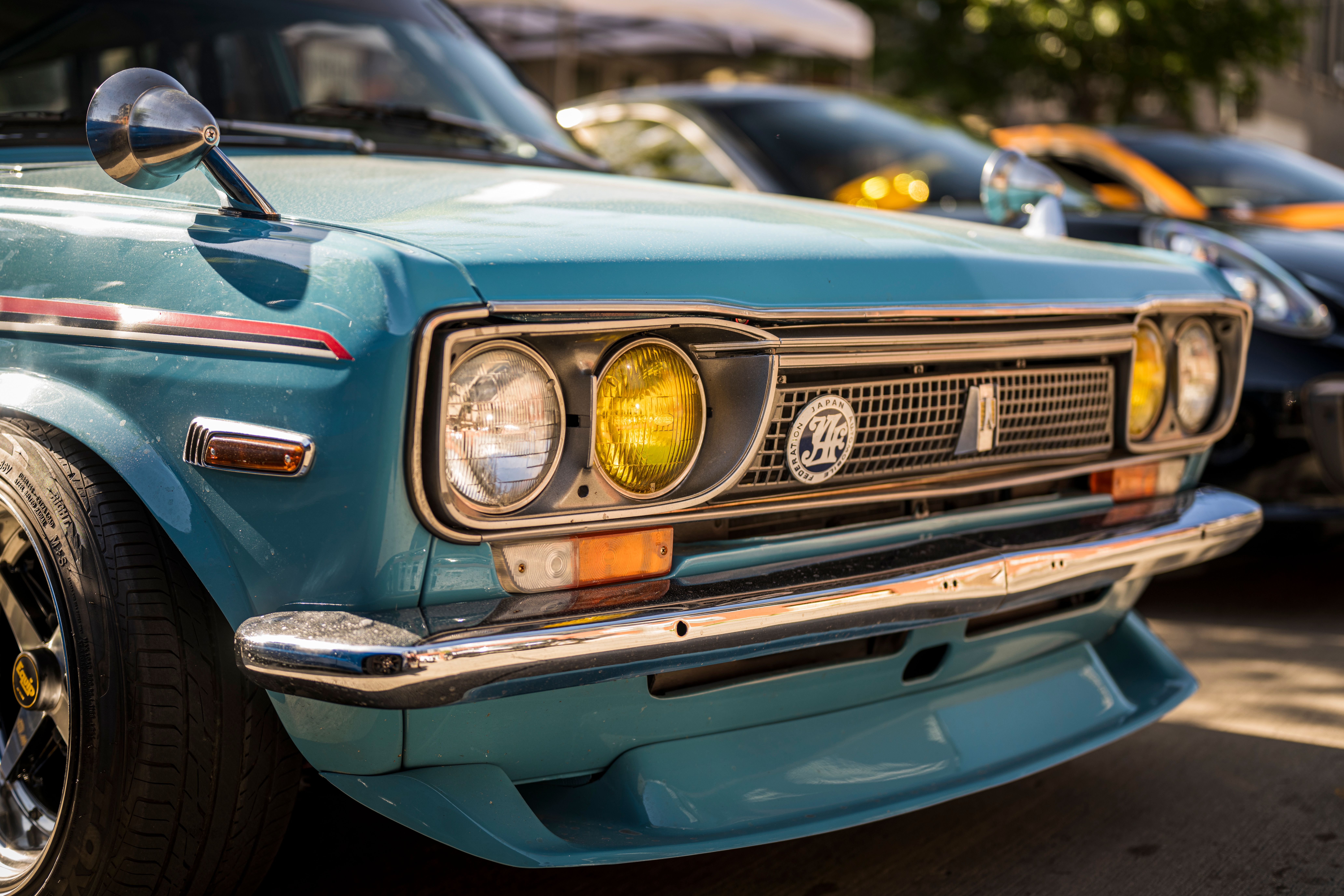 Close-up of Vintage Blue Retro Car with Chrome Details · Free Stock Photo