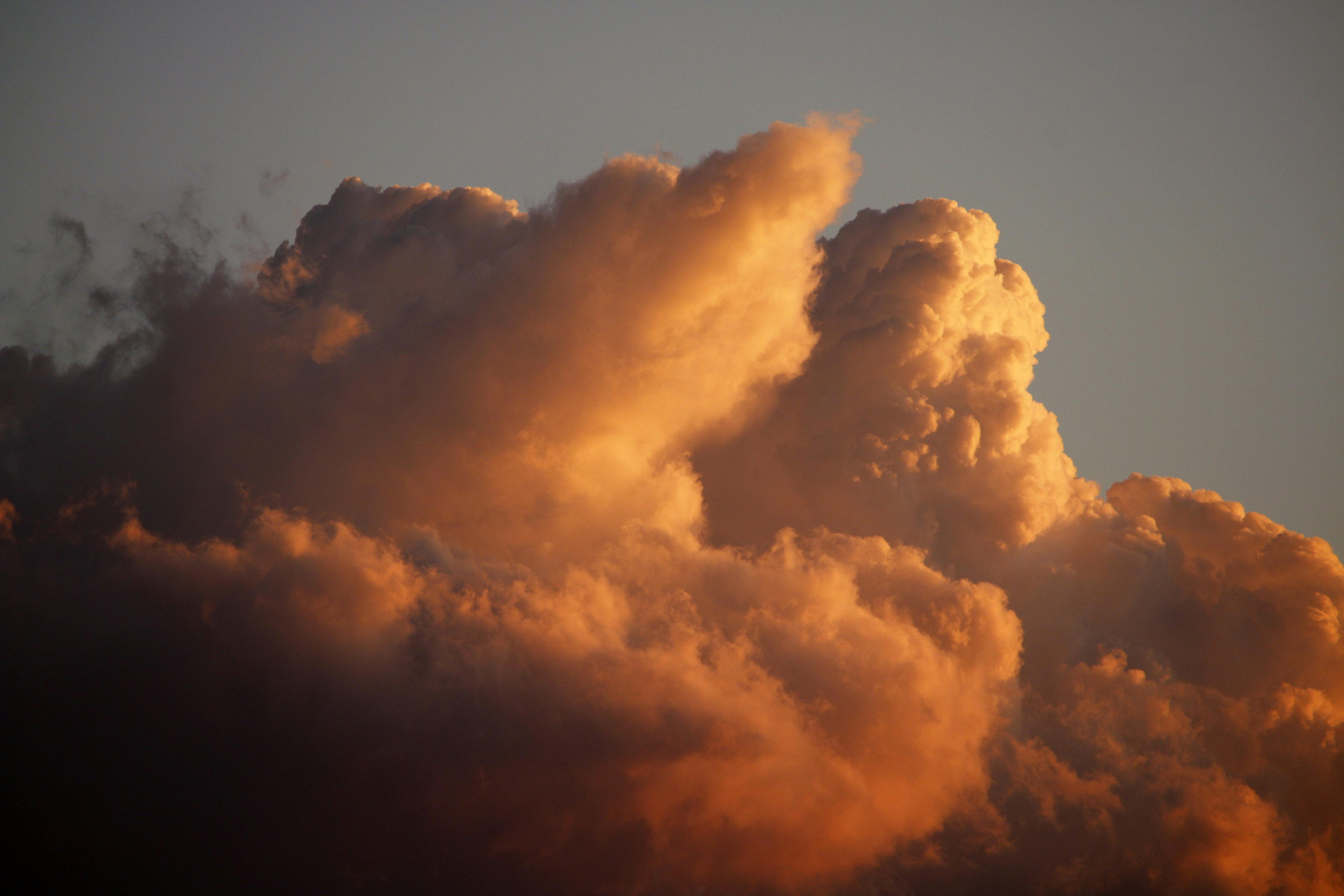 Vibrant Orange Cumulus Sunset Clouds · Free Stock Photo