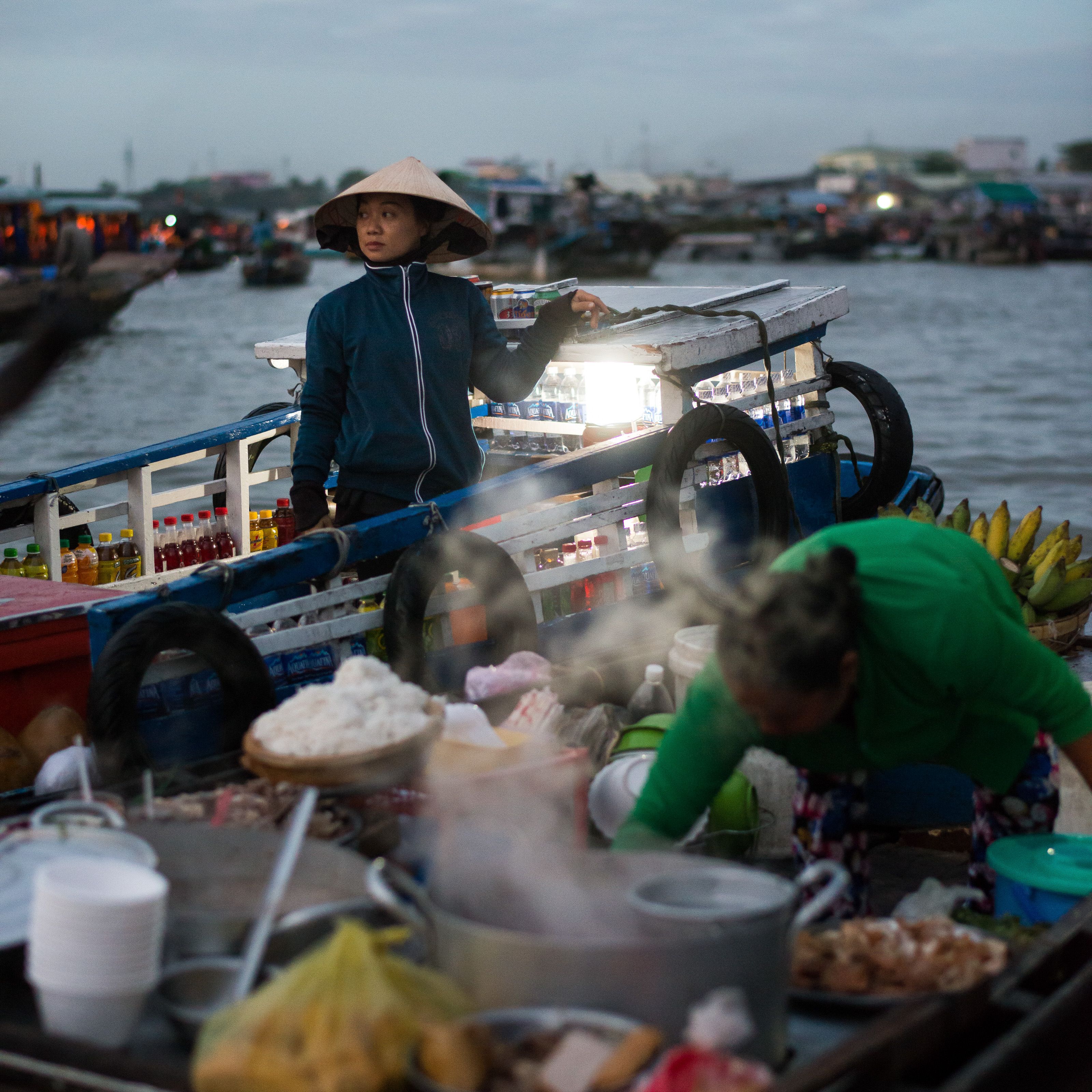 Women Selling Assorted Merchandise On Small Boats · Free Stock Photo