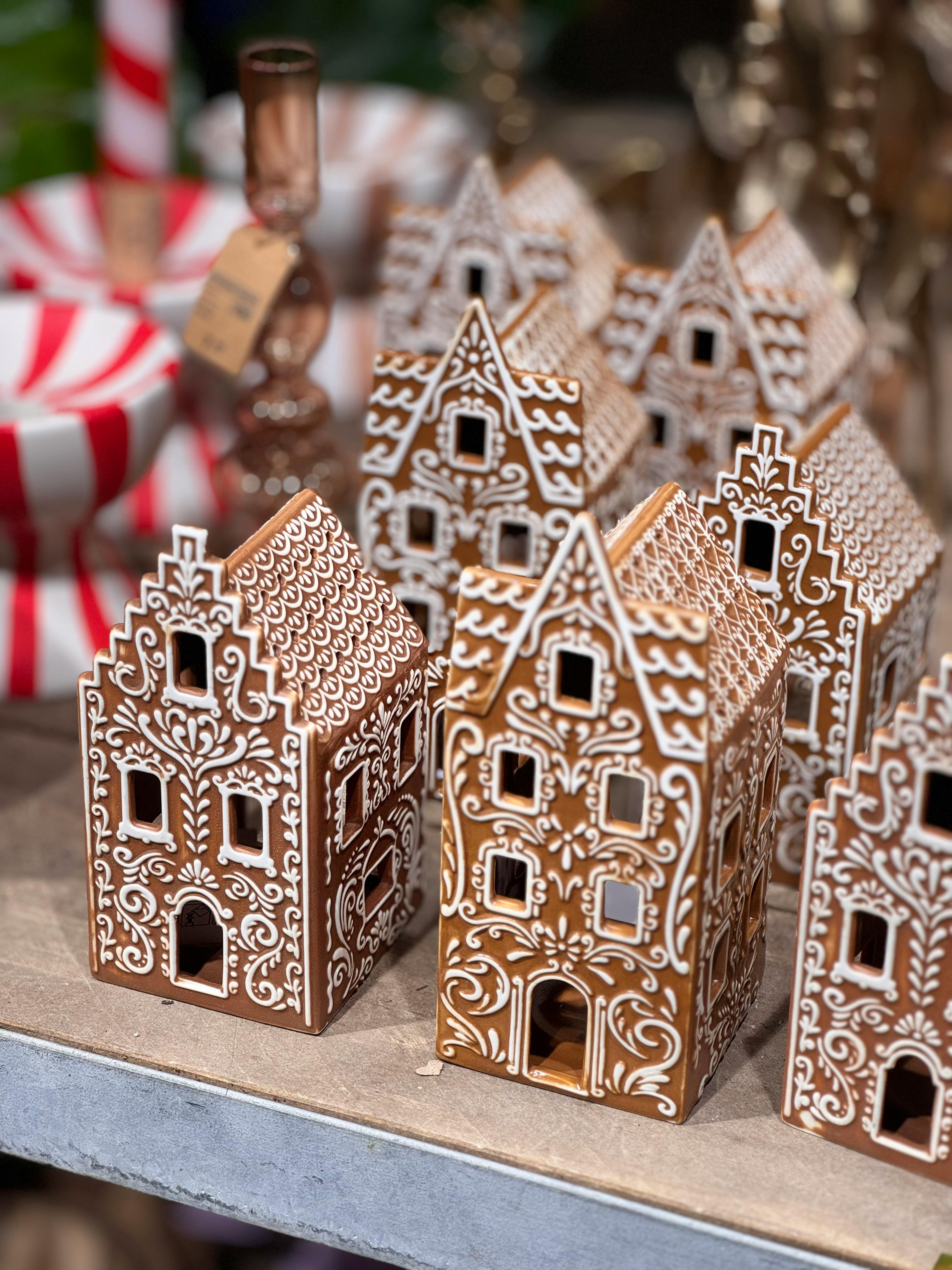 Detailed Gingerbread Houses Display at Holiday Market · Free Stock Photo
