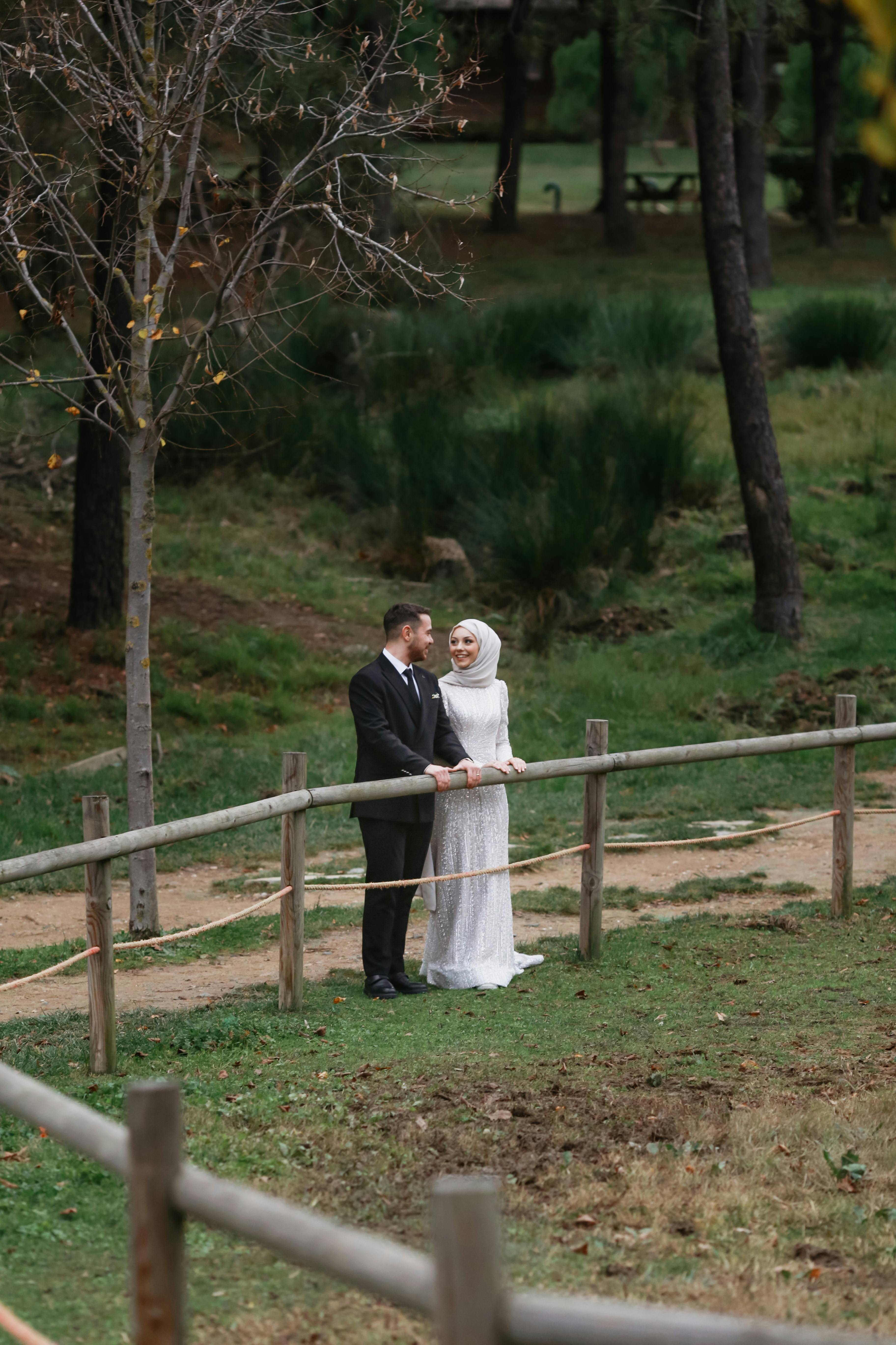 Elegant Outdoor Wedding Portrait of a Couple · Free Stock Photo