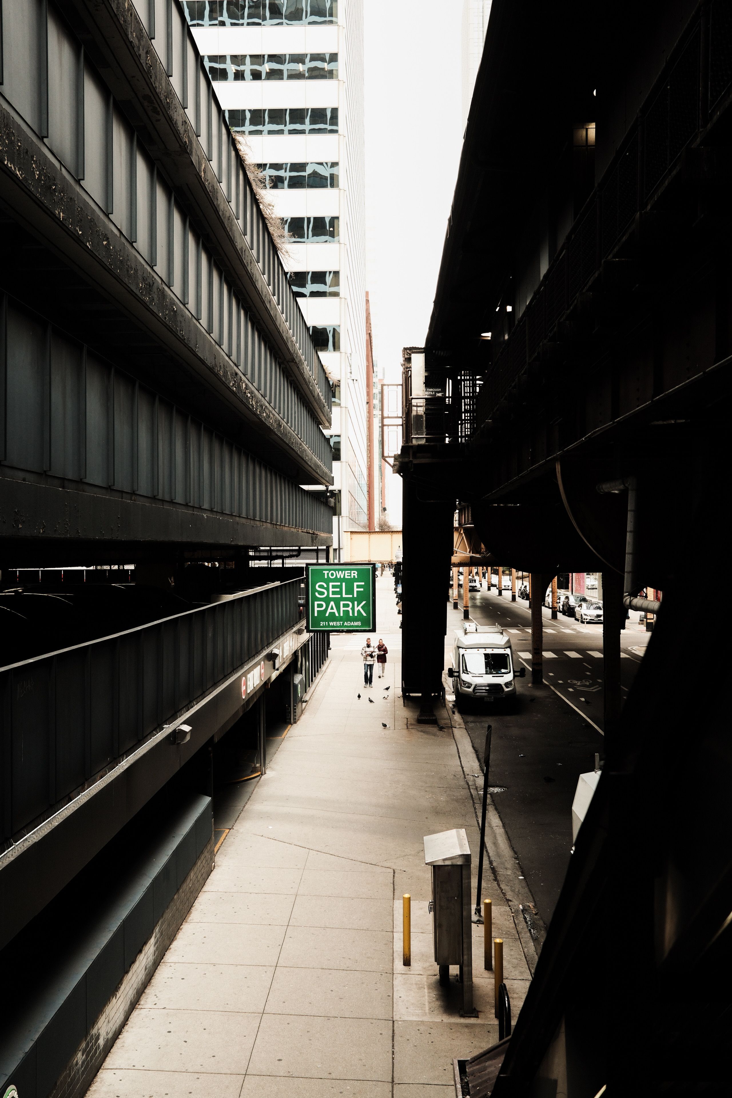 Urban Street Scene with Elevated Tracks · Free Stock Photo