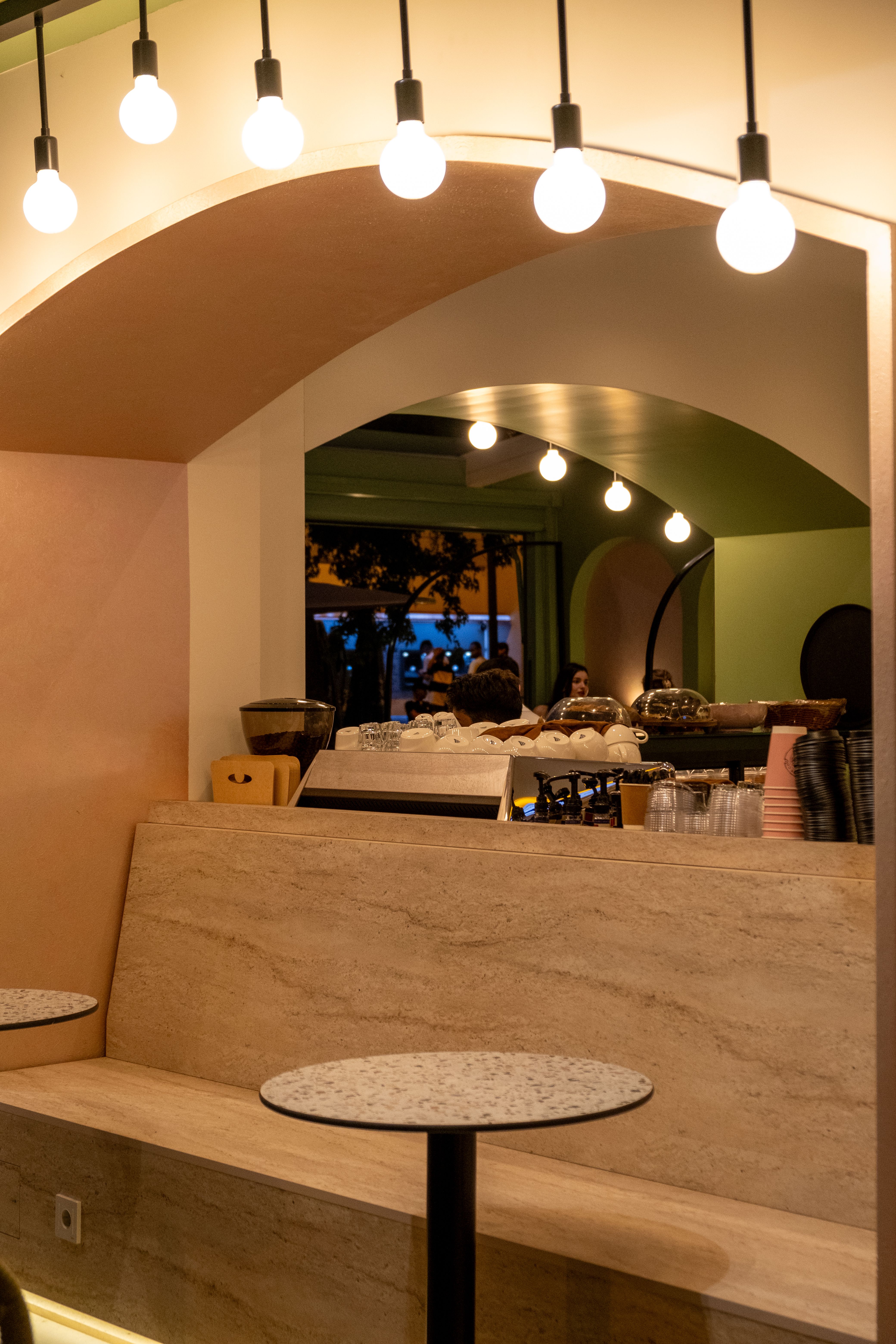 Cozy Modern Cafe Interior with Warm Lighting · Free Stock Photo