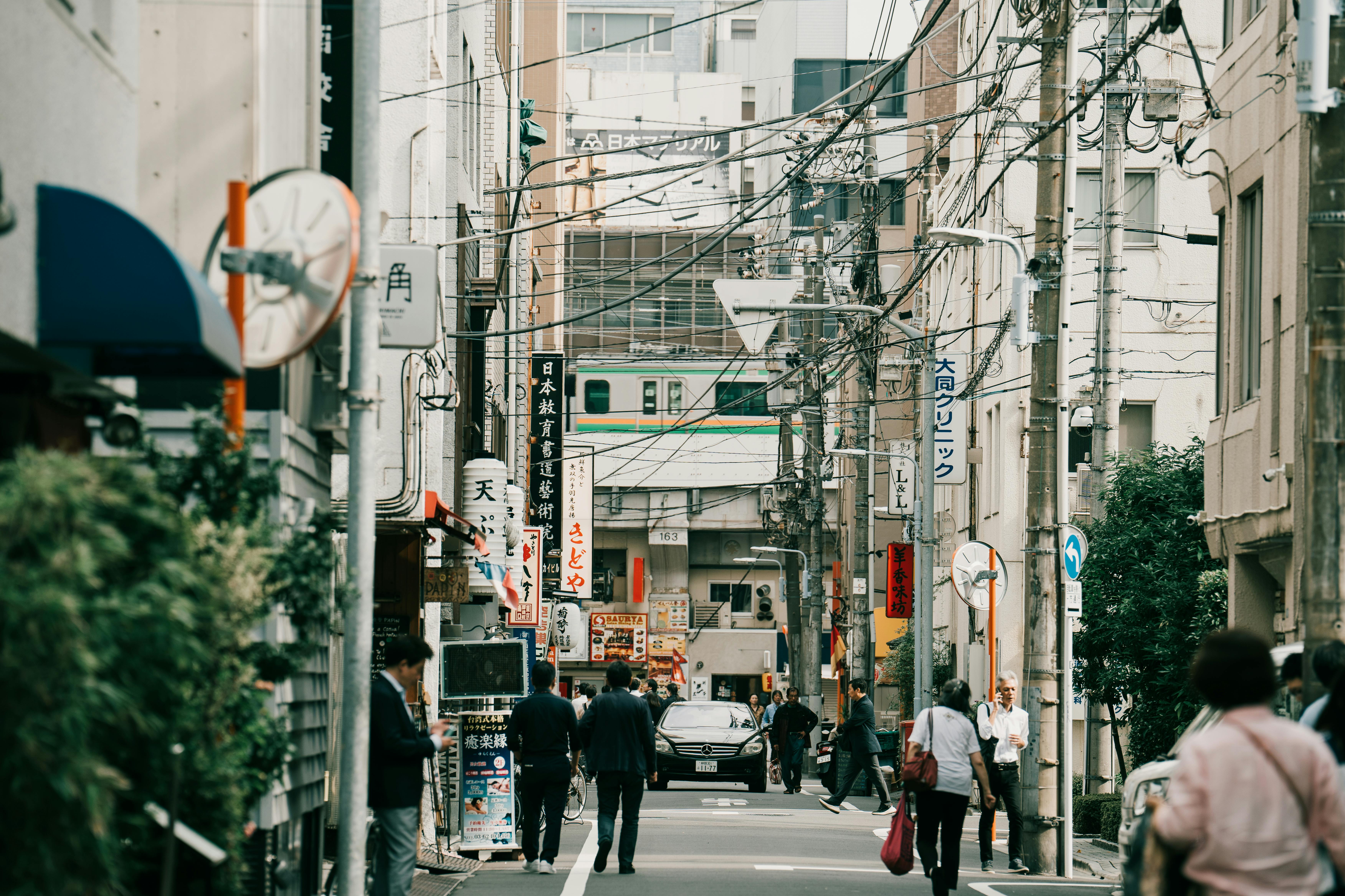Bustling Street Scene in Urban Japan · Free Stock Photo