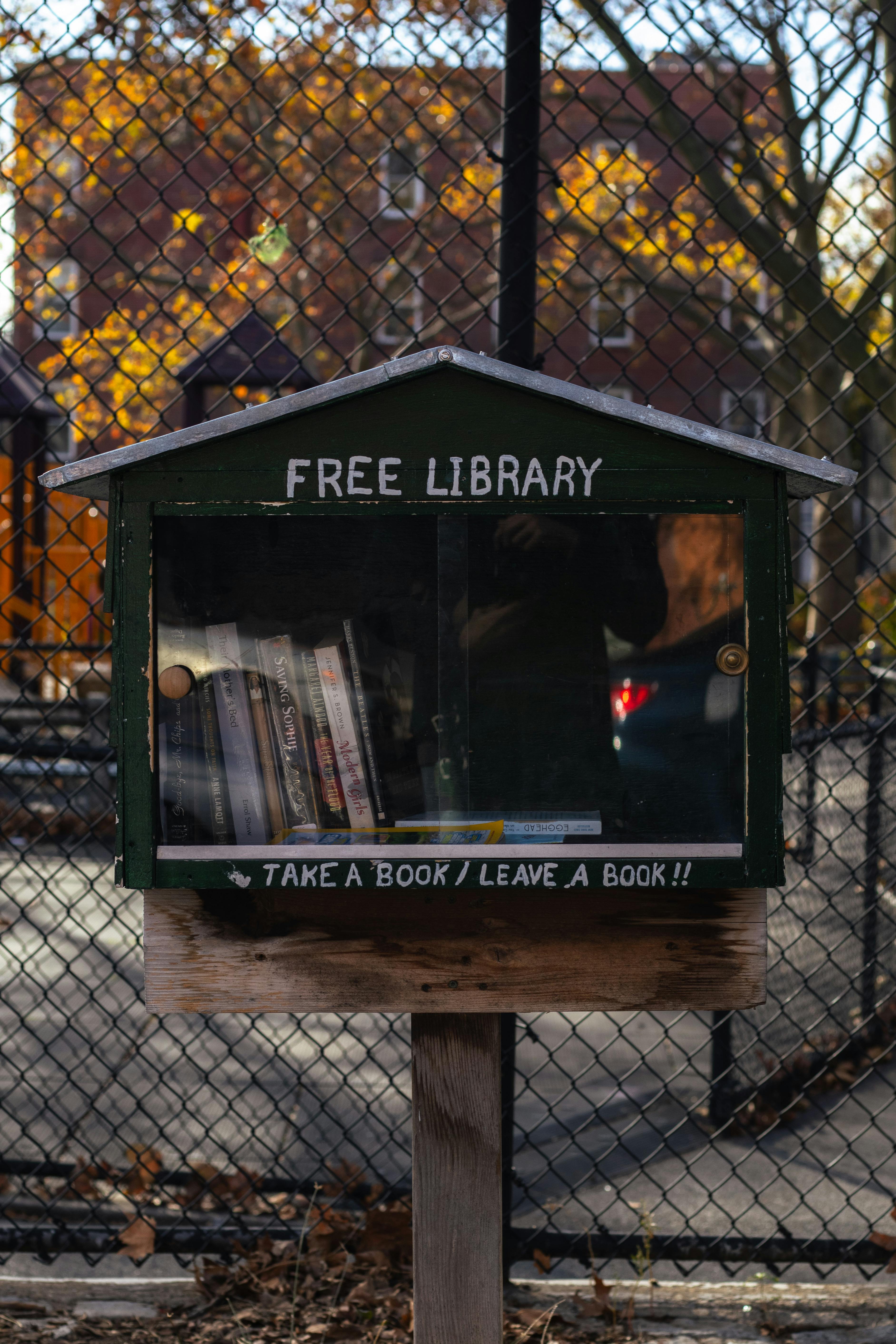 Charming Outdoor Free Library with Books on Shelf · Free Stock Photo
