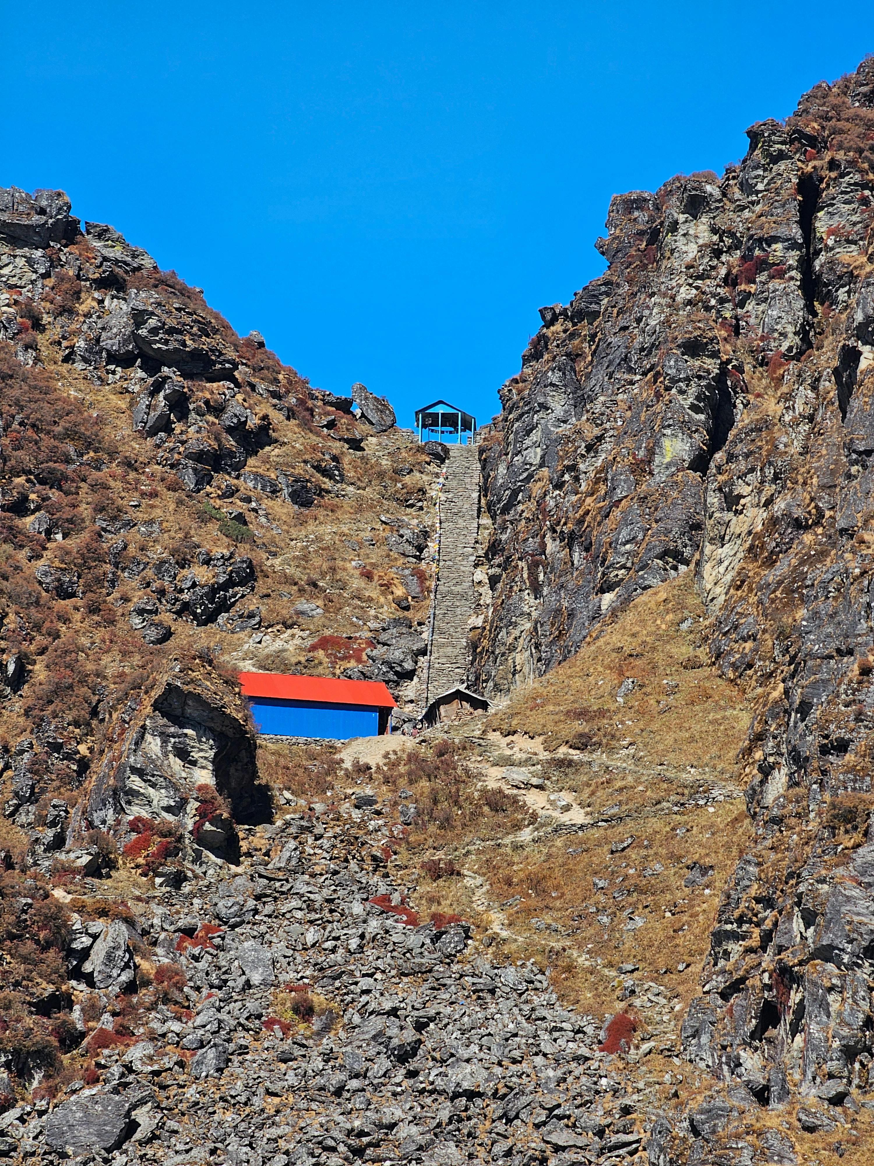 Steep Mountain Steps and Rock Formation · Free Stock Photo