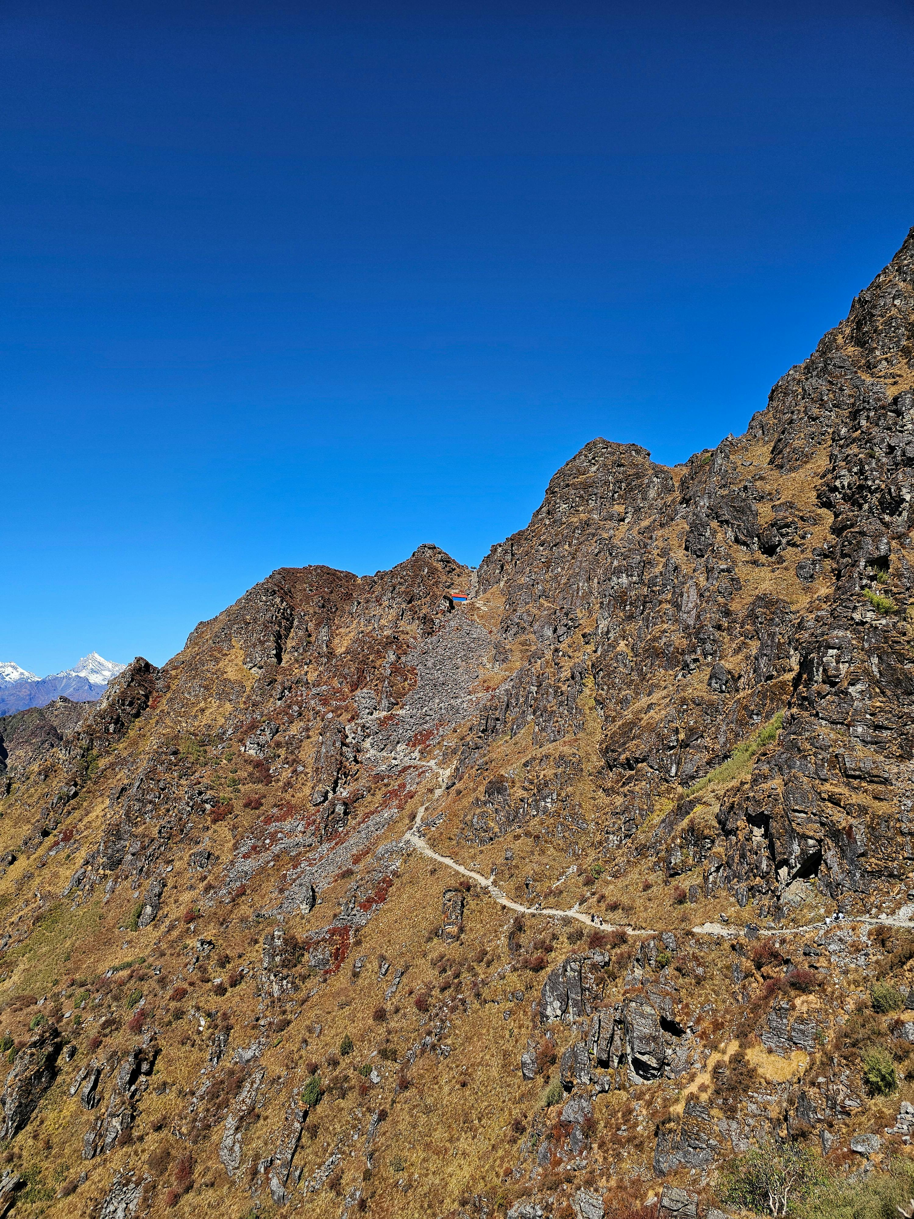 Rugged Mountain Trail under Clear Blue Sky · Free Stock Photo