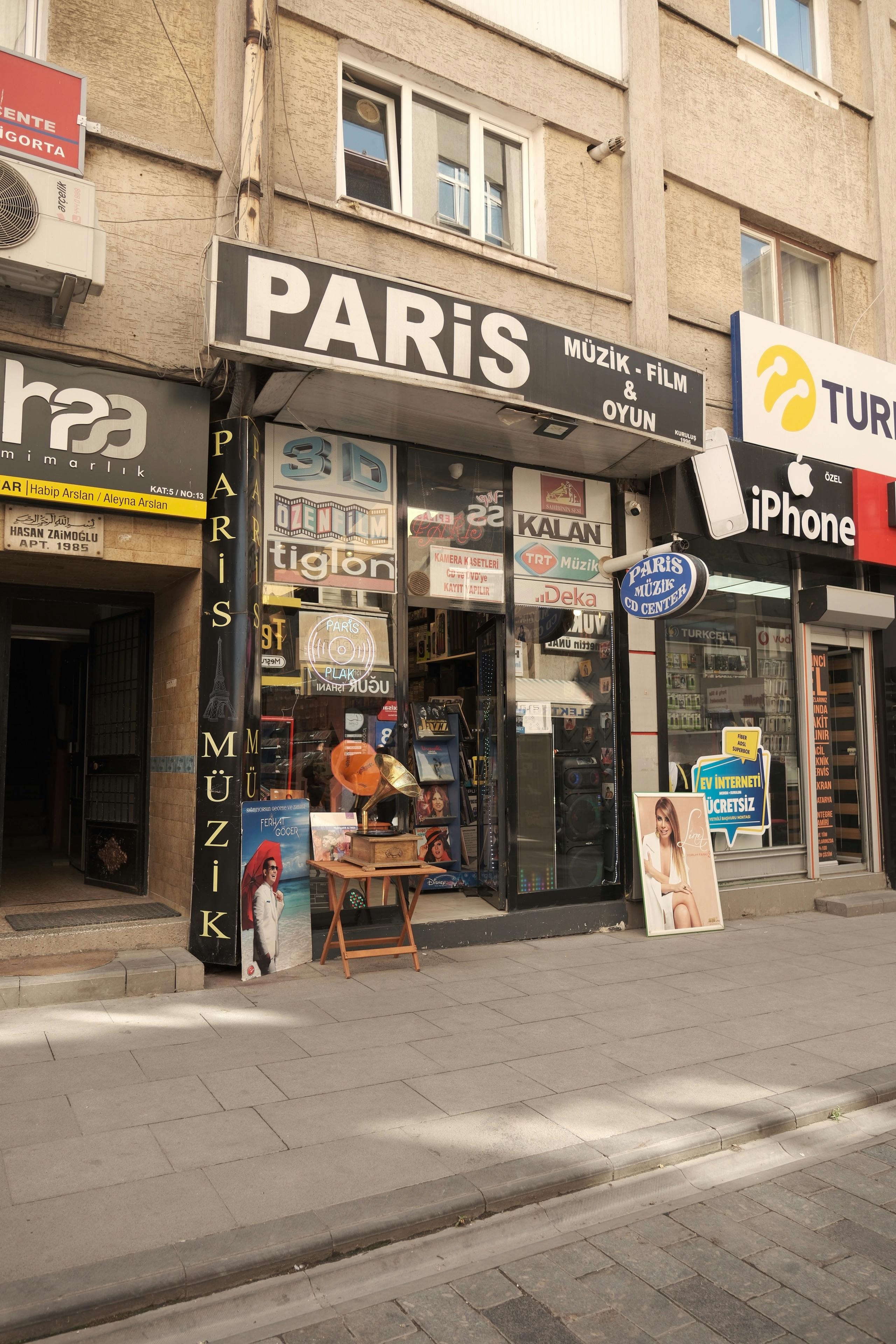 Music and Film Storefront in Urban Setting · Free Stock Photo
