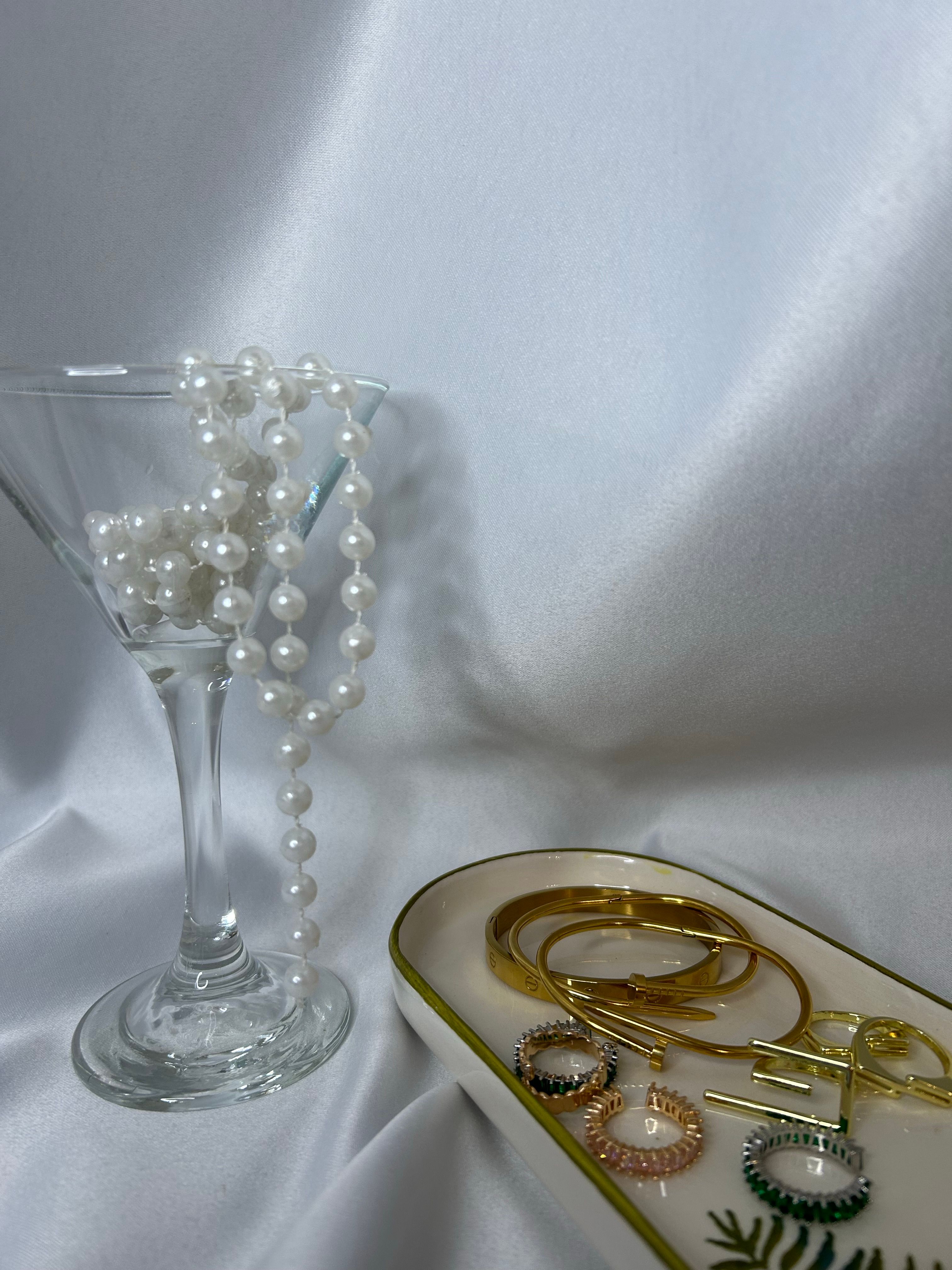 Elegant Jewelry Display with Pearls and Gold · Free Stock Photo