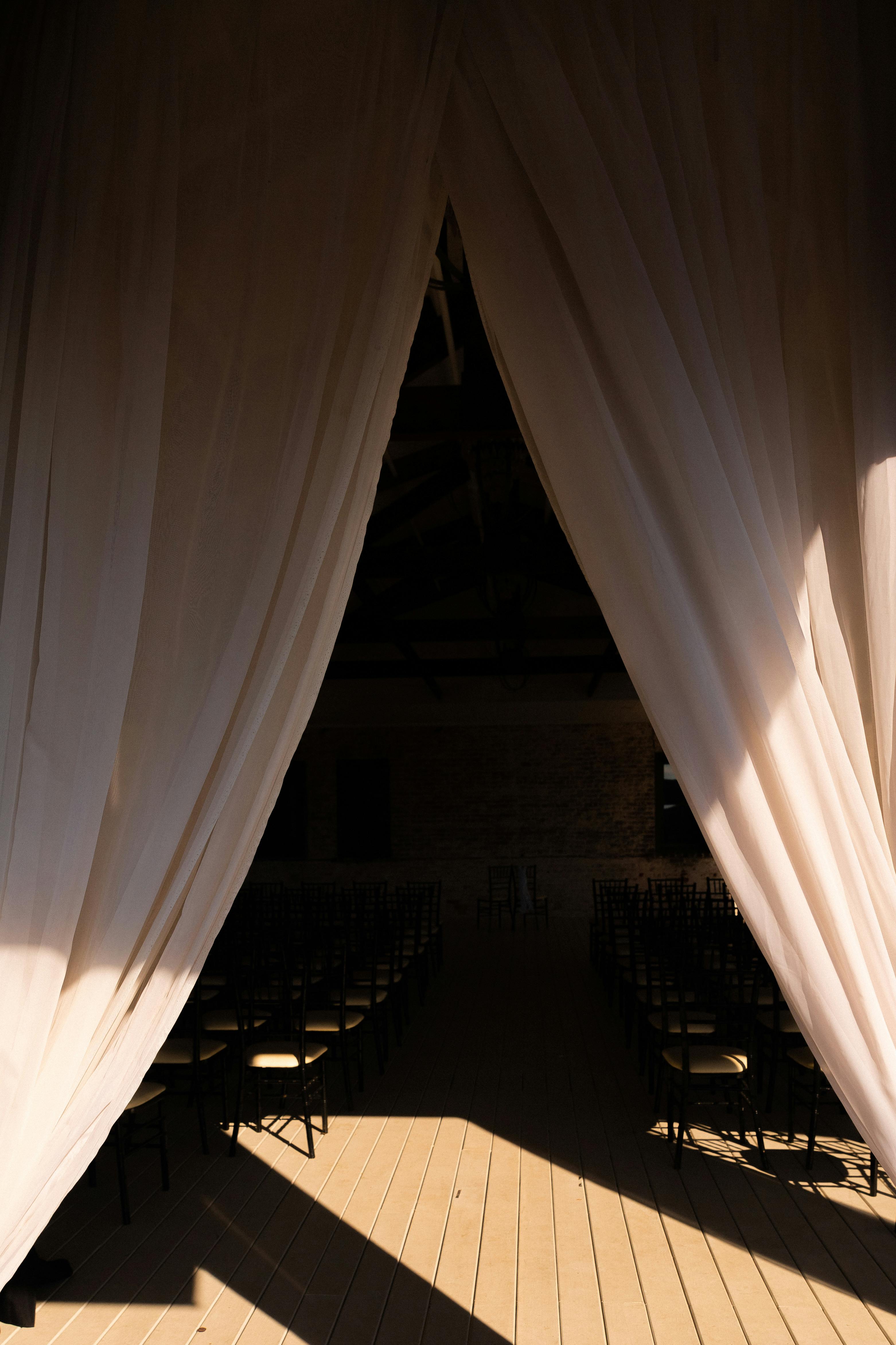 Elegant Wedding Venue with Draped Curtains · Free Stock Photo