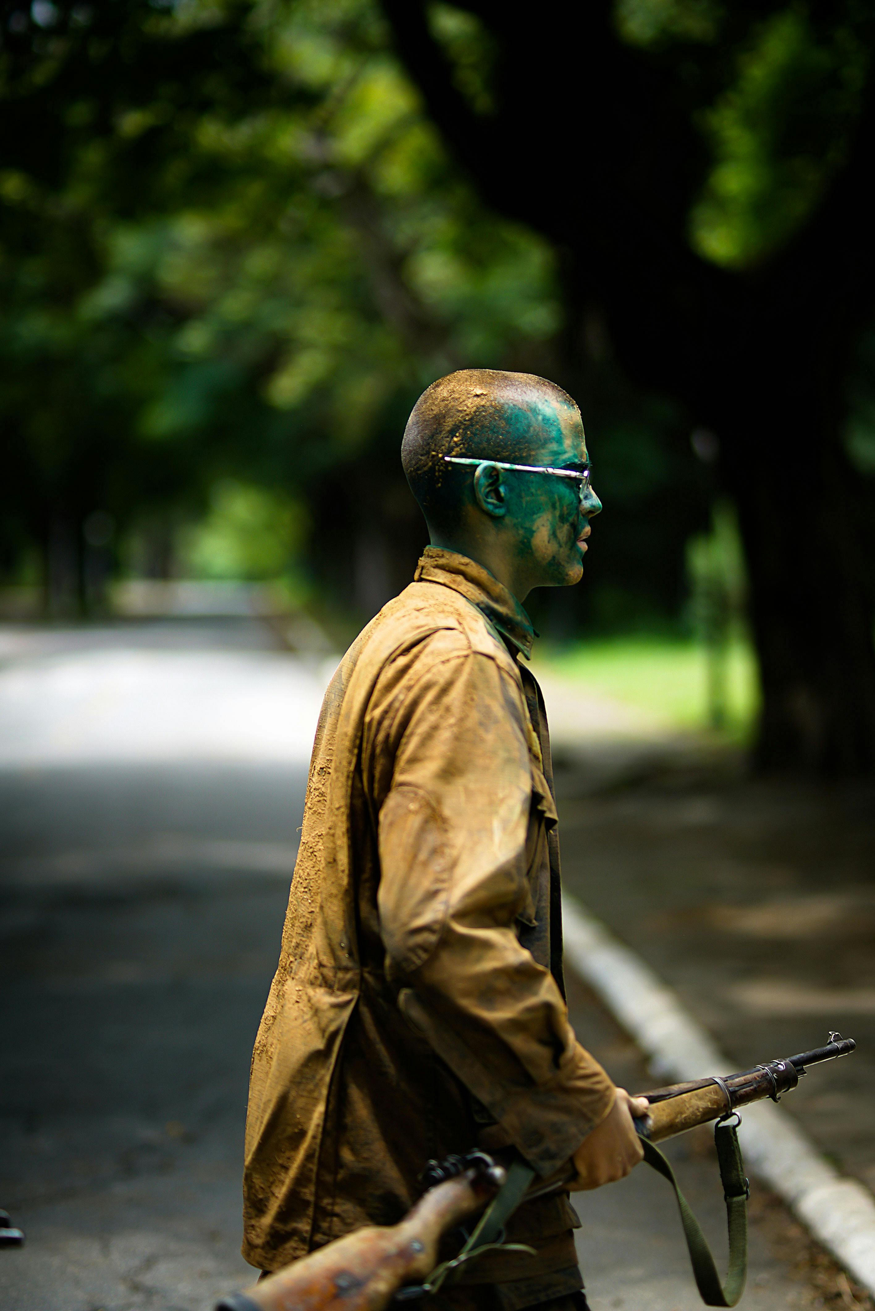 Portrait of a Camouflaged Soldier Outdoors · Free Stock Photo