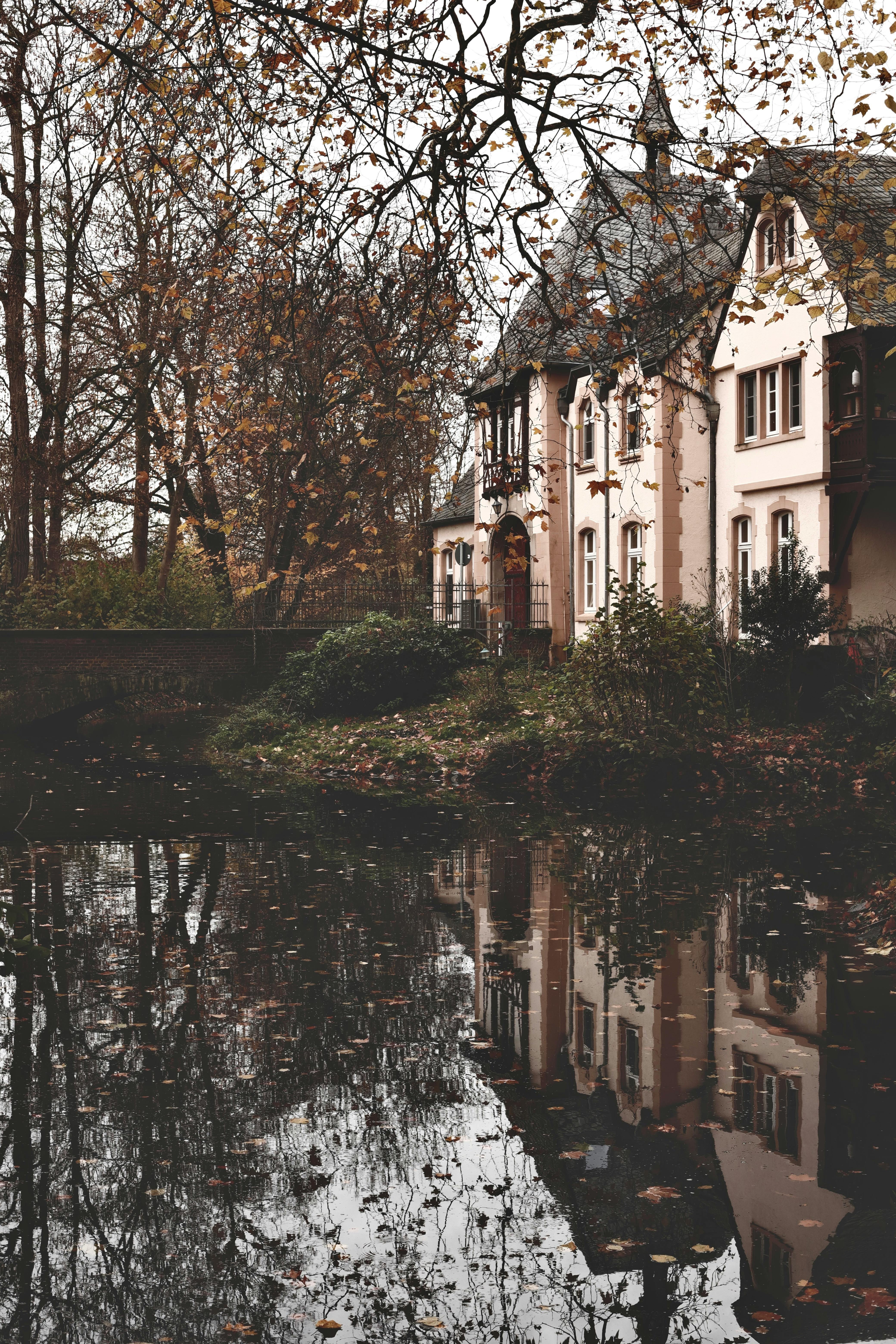 Historic Estate with Scenic Garden Pond · Free Stock Photo