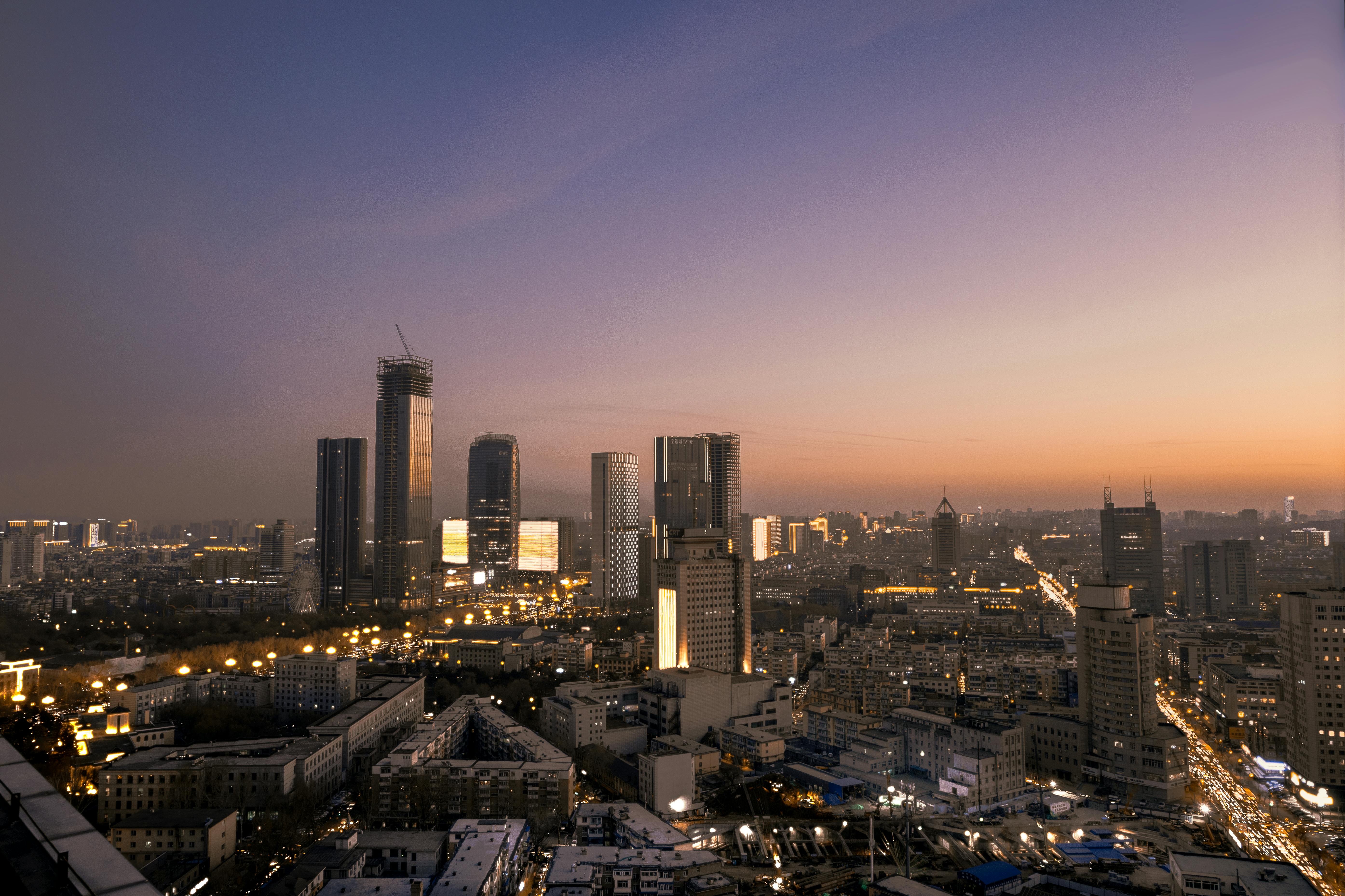 Sunset Skyline of a Modern Cityscape · Free Stock Photo