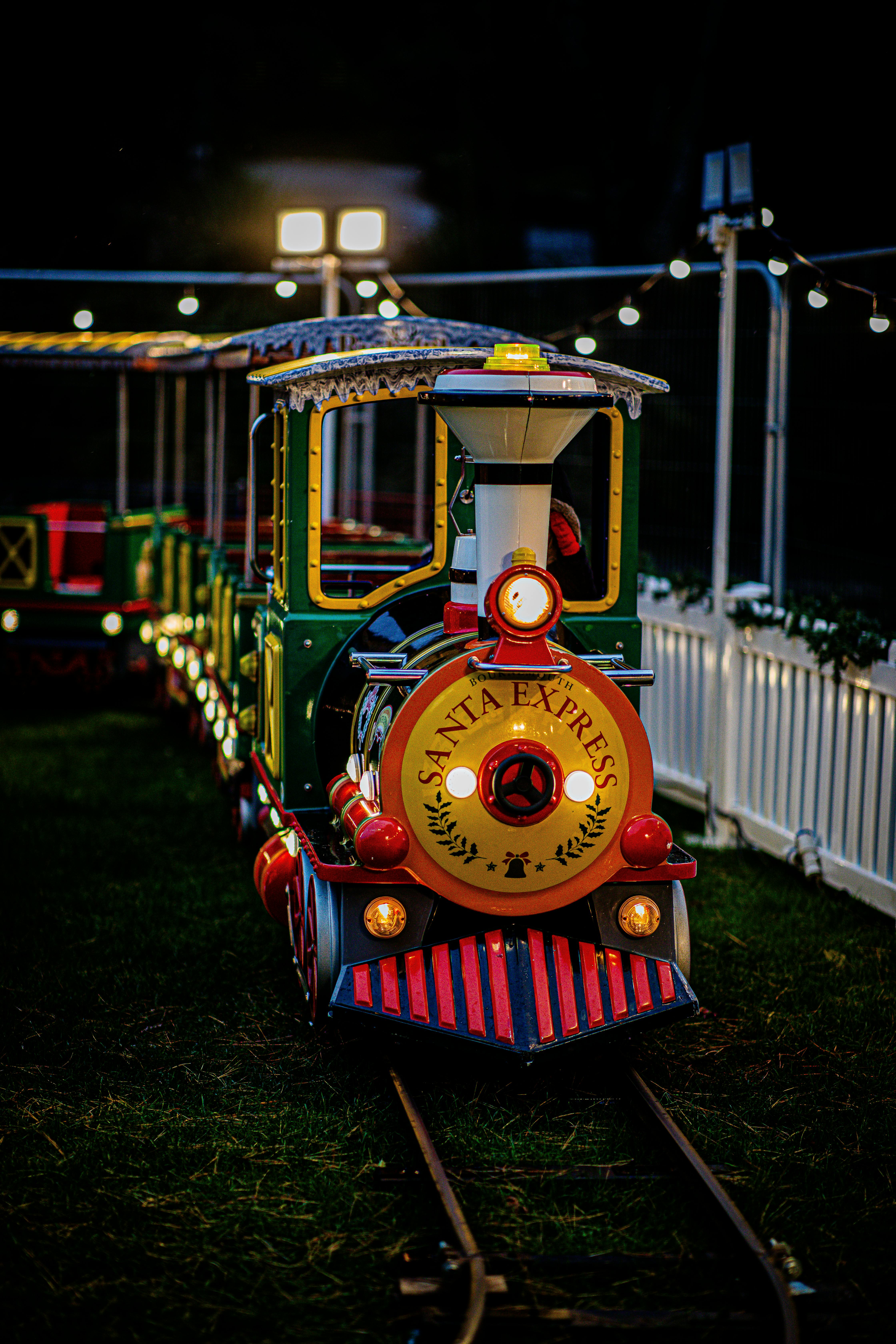 Festive Santa Express Miniature Train at Night · Free Stock Photo