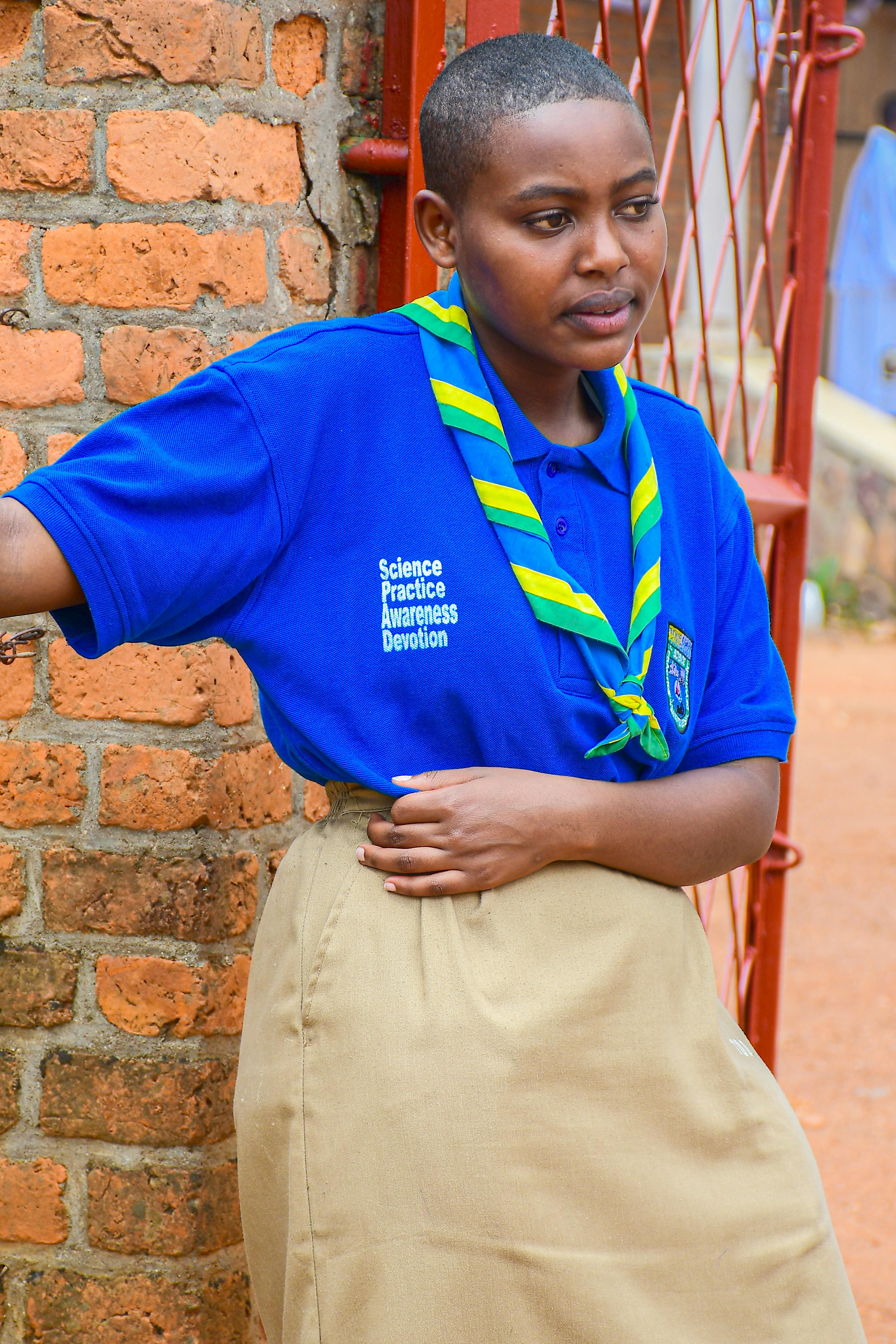 Young Woman in Rwanda in Blue Scout Uniform · Free Stock Photo