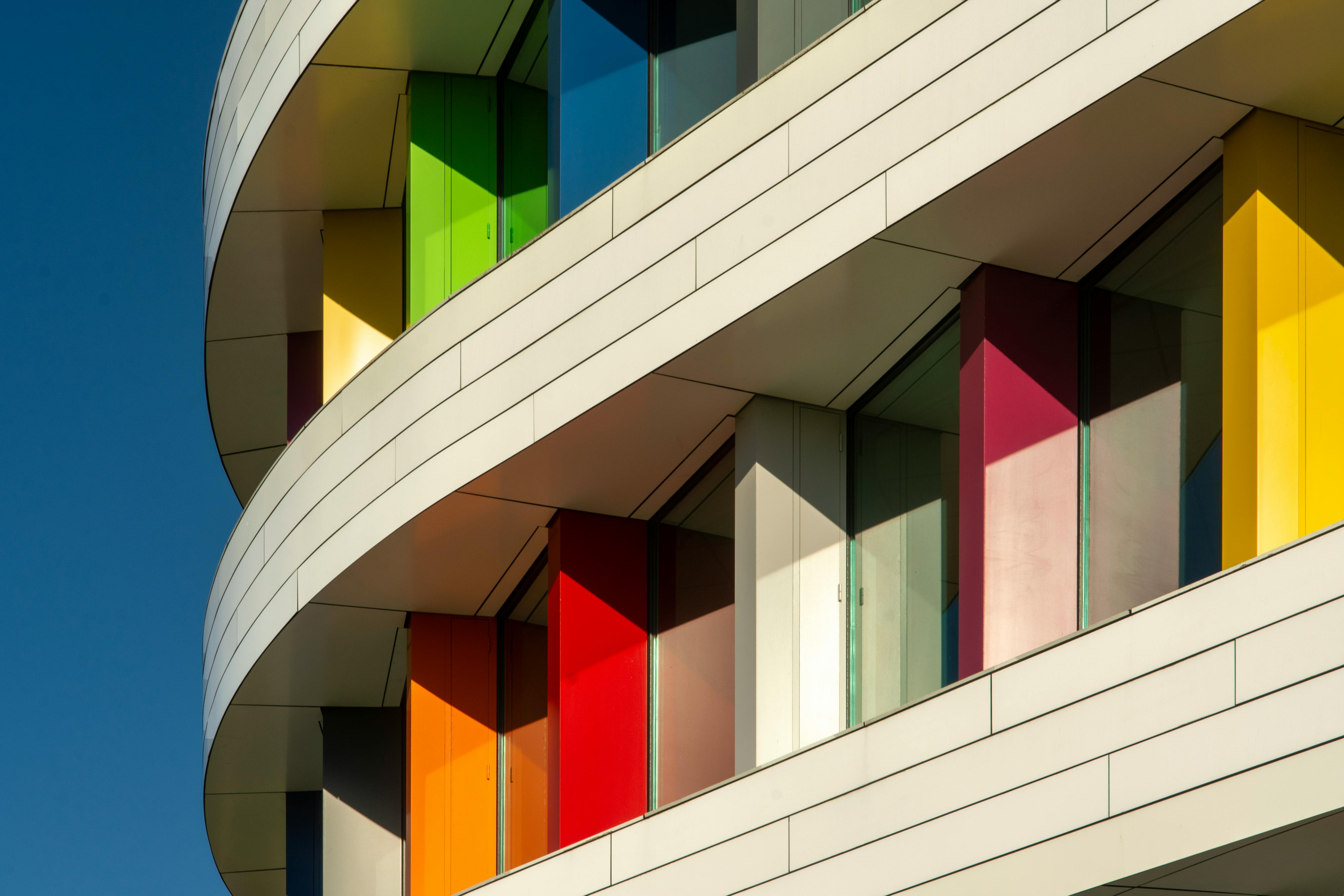Colorful Modern Building Facade with Geometric Patterns · Free Stock Photo