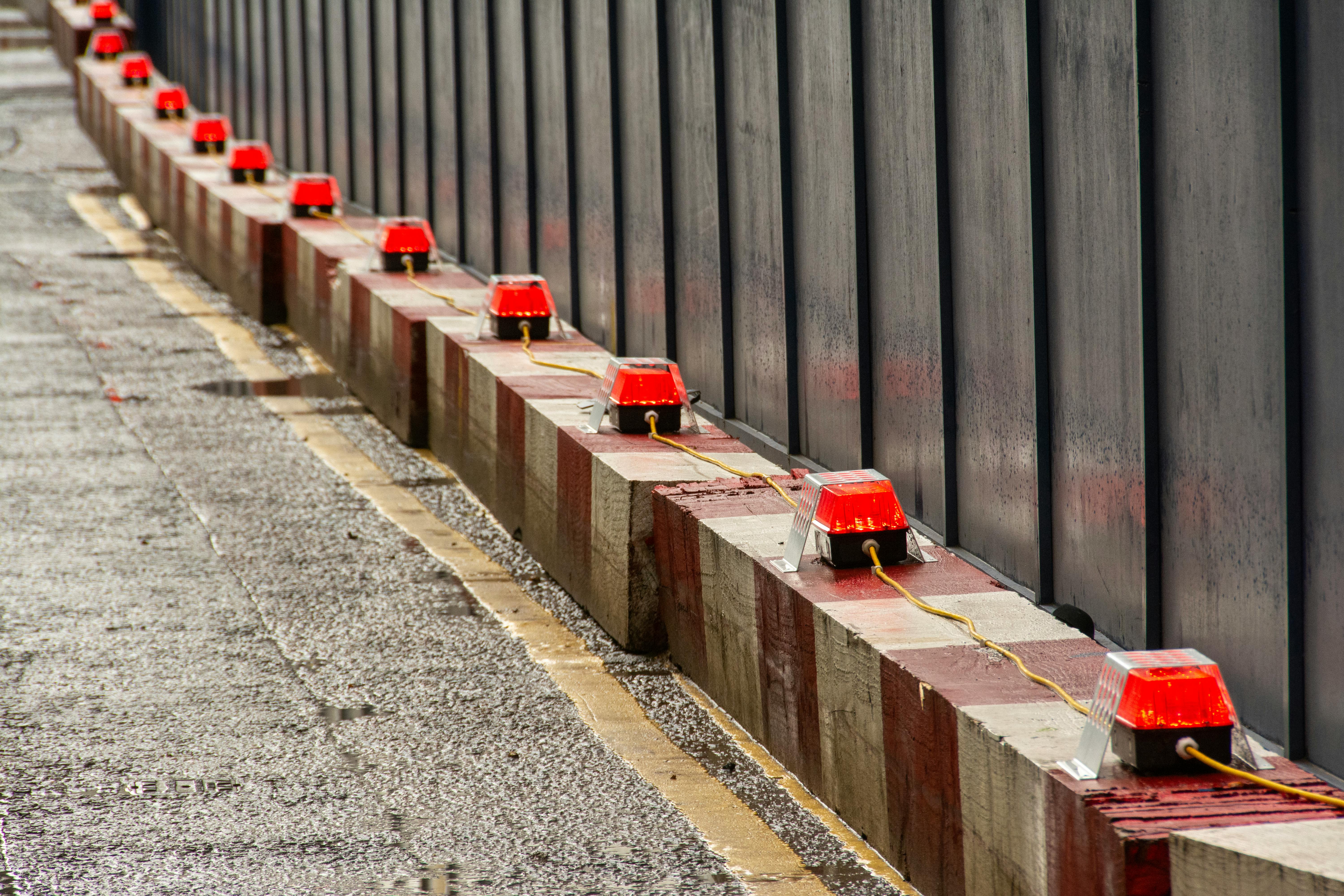 Construction Safety Barriers with Red Warning Lights · Free Stock Photo