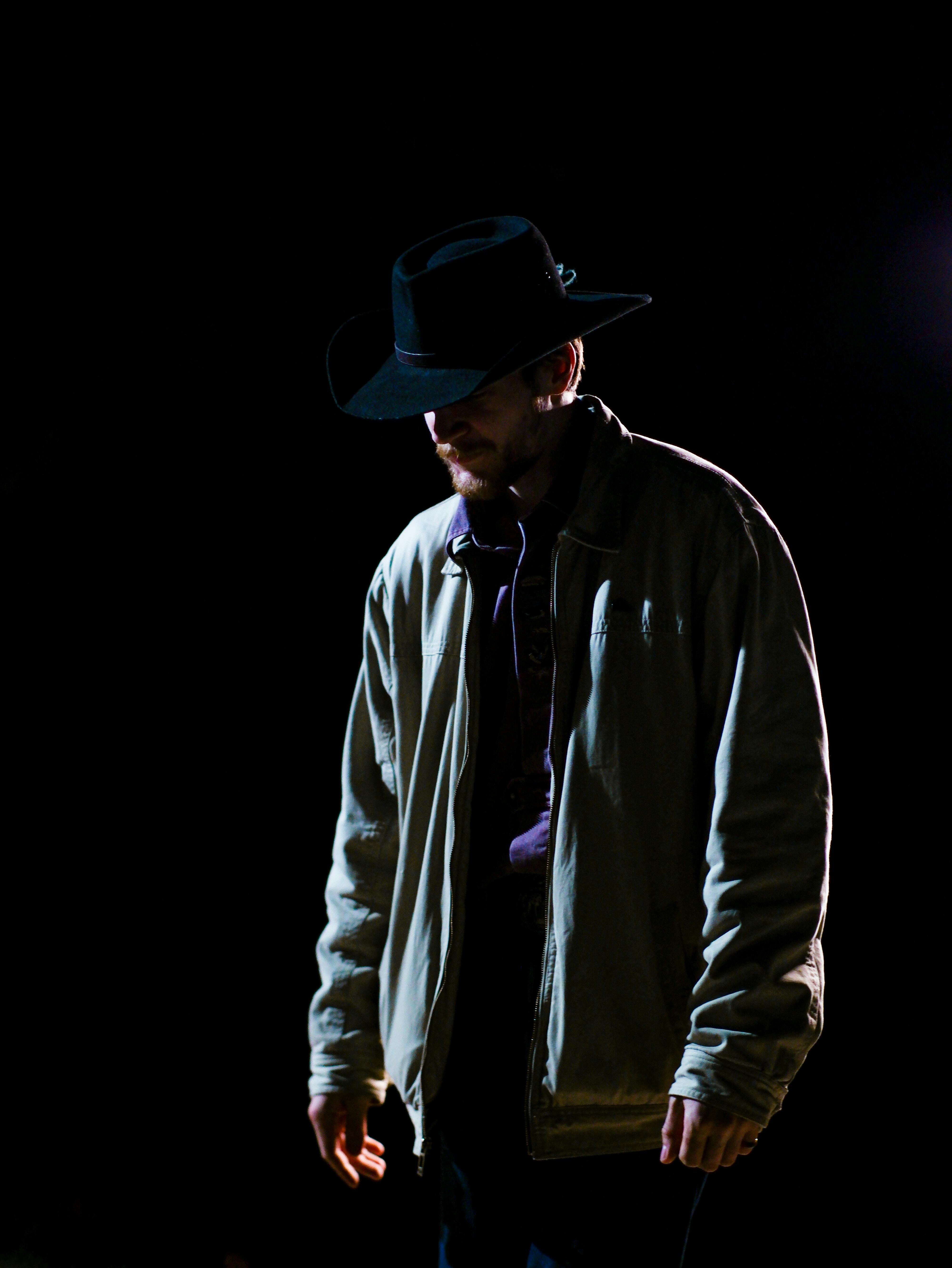 Mysterious Cowboy under Night Lighting · Free Stock Photo