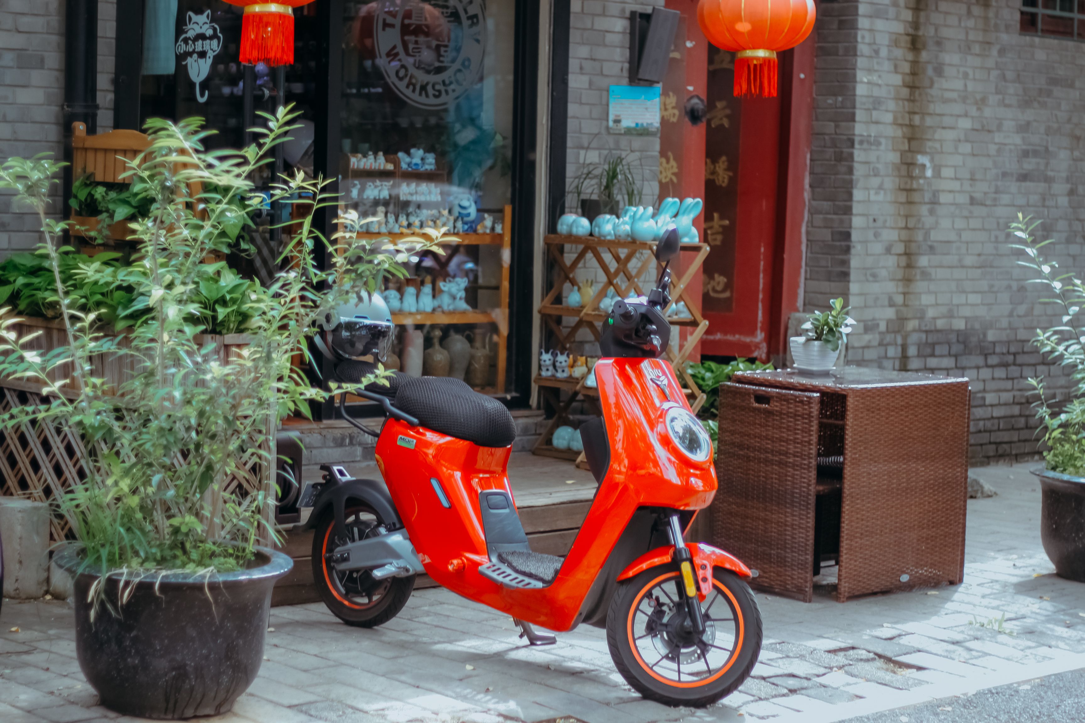 Bright Red Electric Scooter on Urban Street · Free Stock Photo