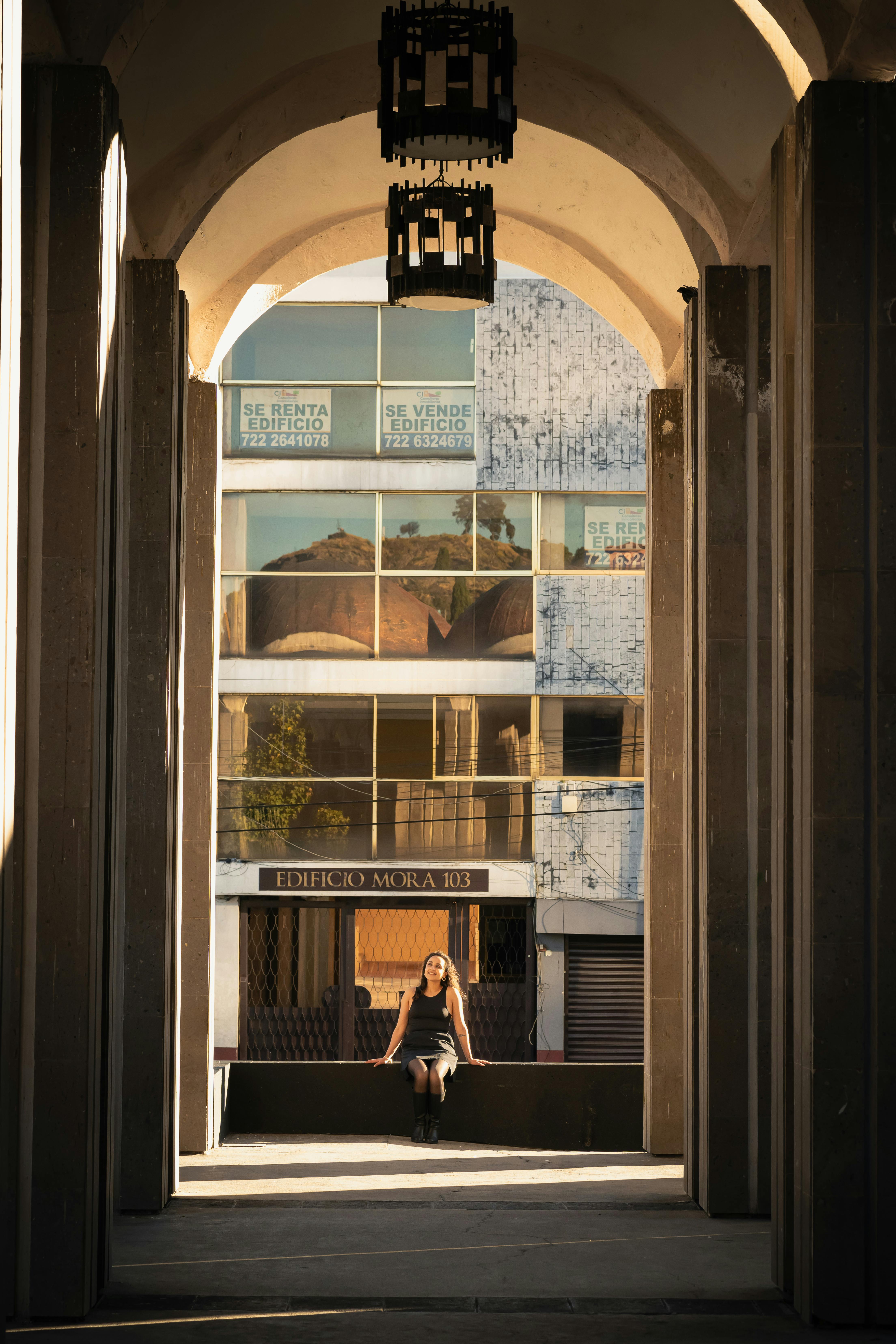 Urban passageway with architectural arches · Free Stock Photo