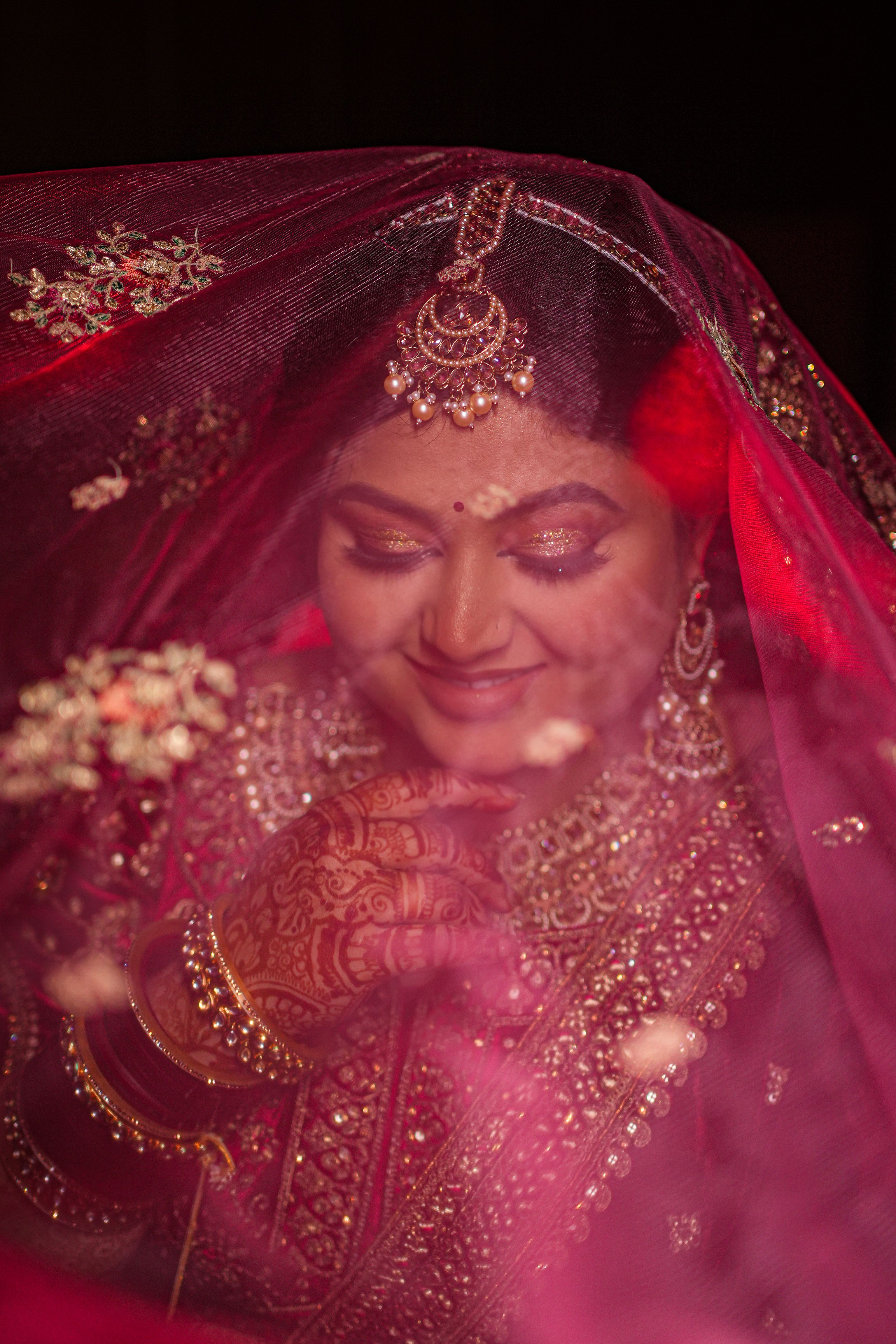 Elegant Indian Bride in Red Veil Portrait · Free Stock Photo