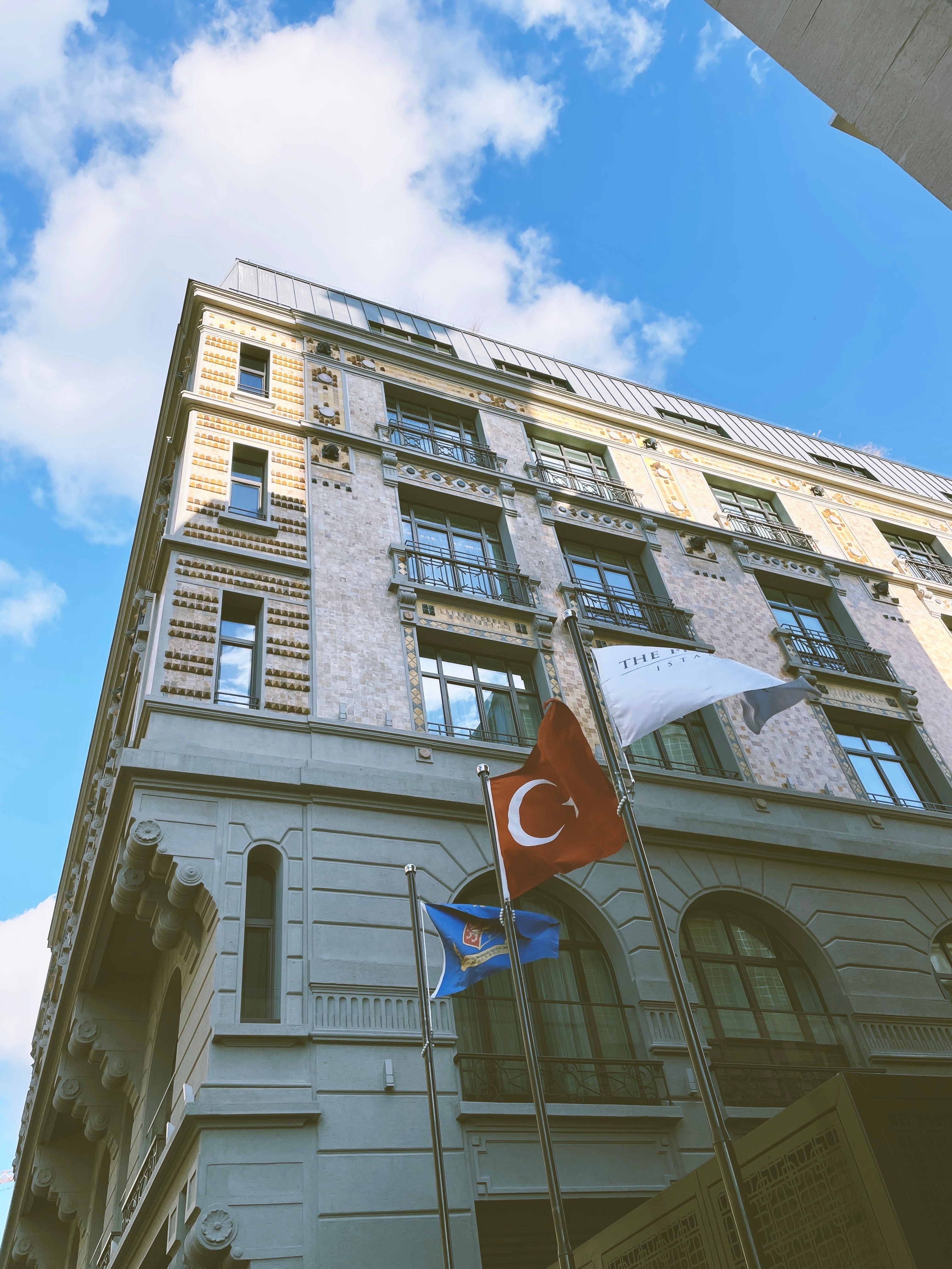 Historic Building with Turkish Flag in Cityscape · Free Stock Photo