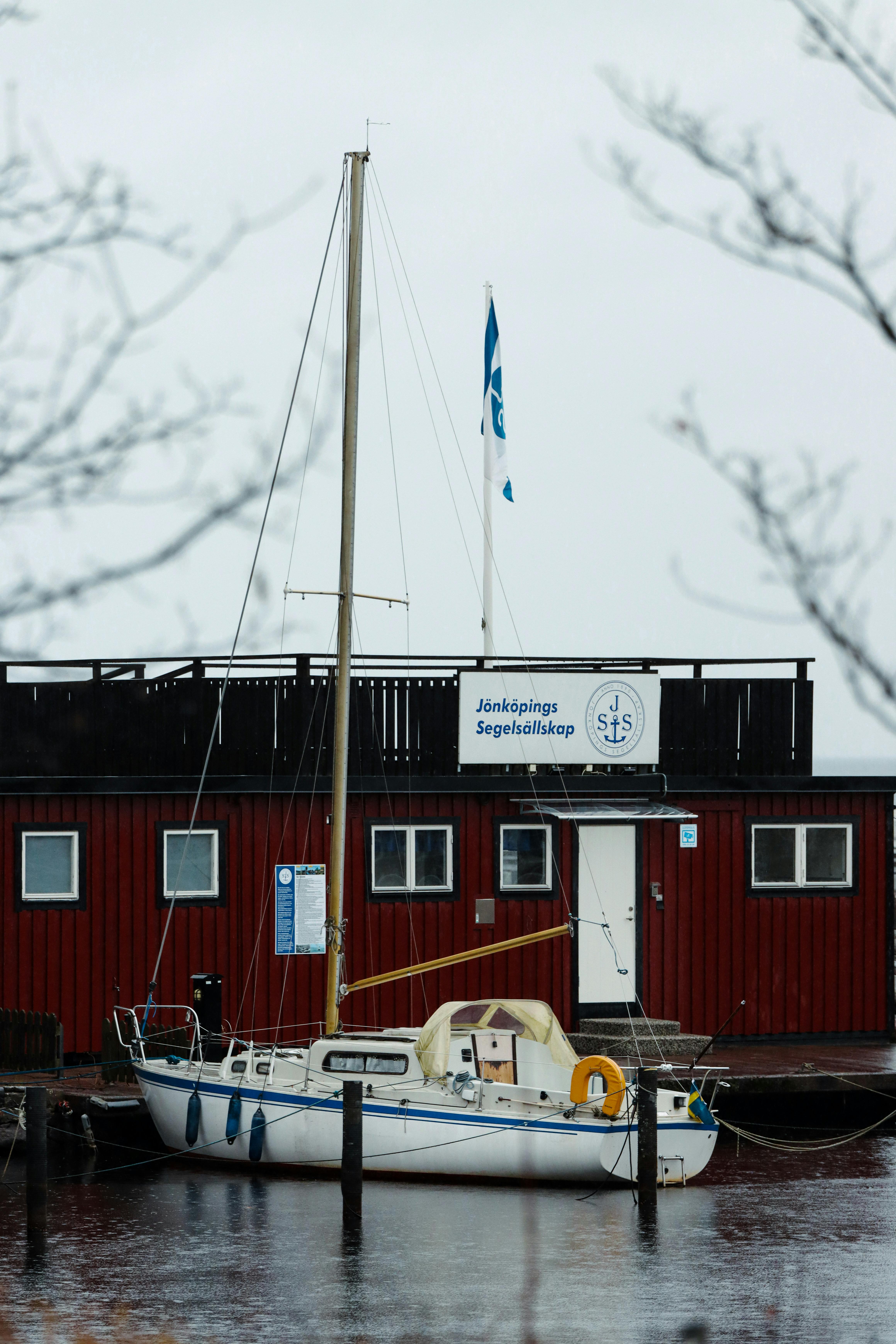 Sailboat Docked at Jönköping Marina, Sweden · Free Stock Photo