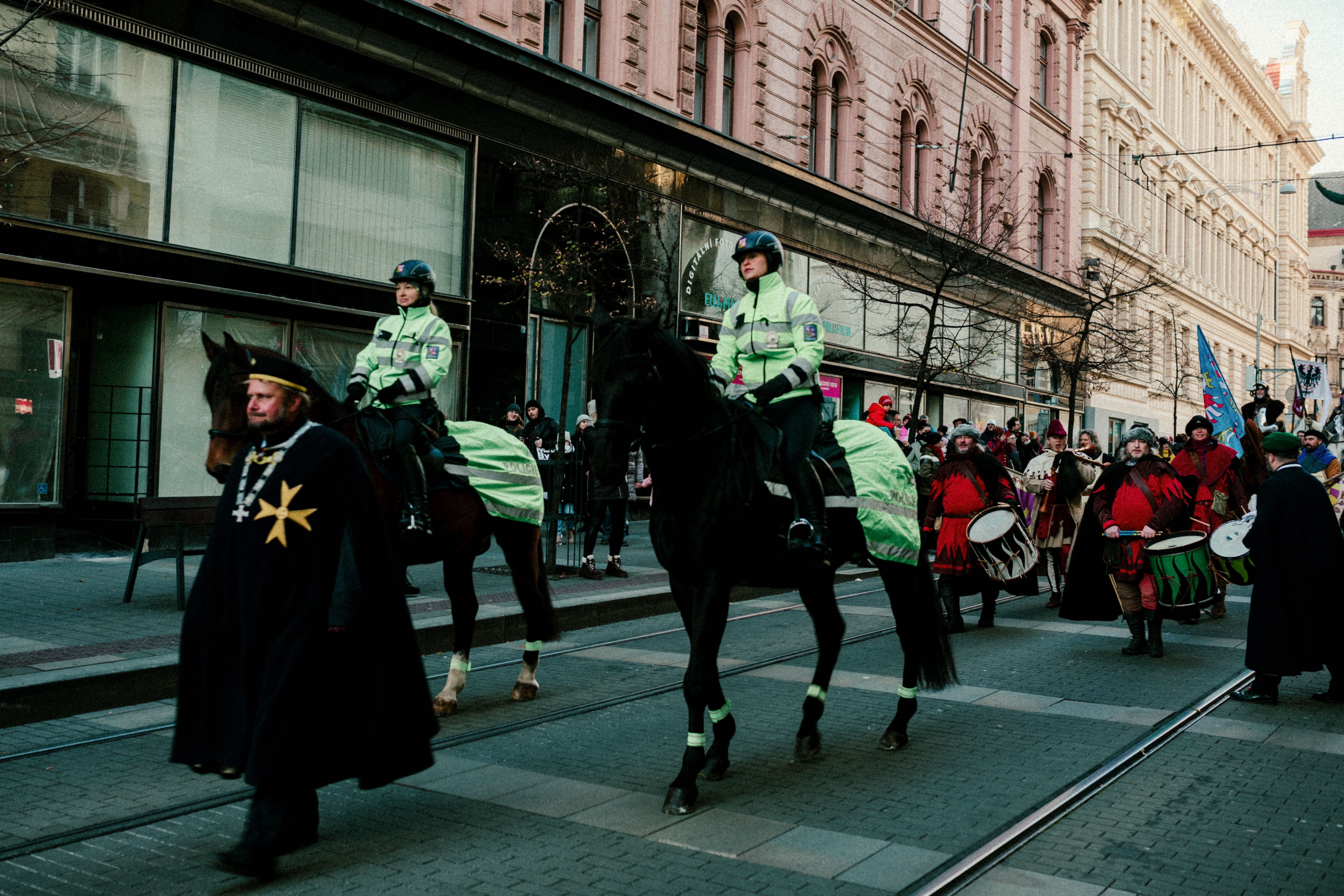 Colorful Street Parade with Riders and Musicians · Free Stock Photo